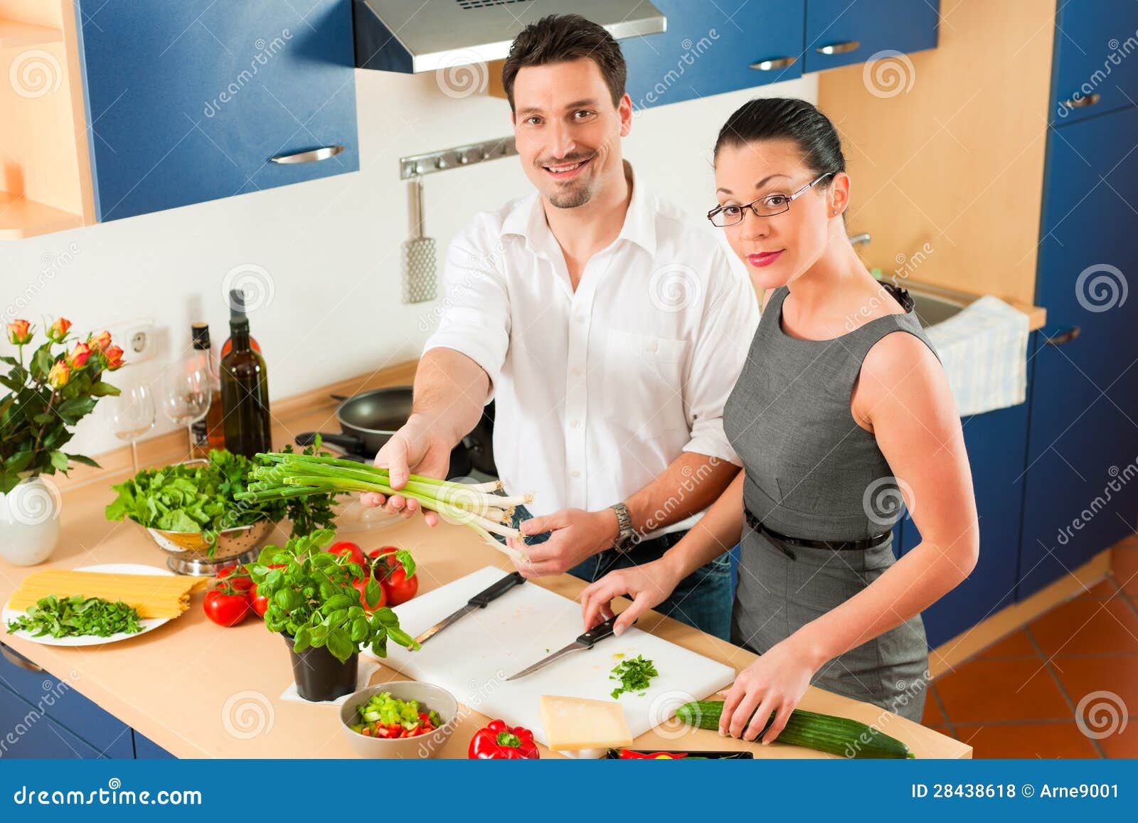 Couple Cooking Together in Kitchen Stock Photo - Image of crudits ...
