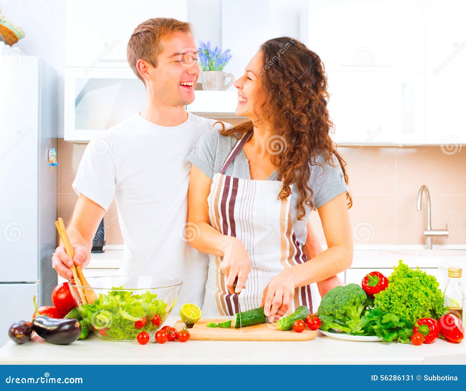 Couple Cooking Together in Their Kitchen Stock Image - Image of family ...