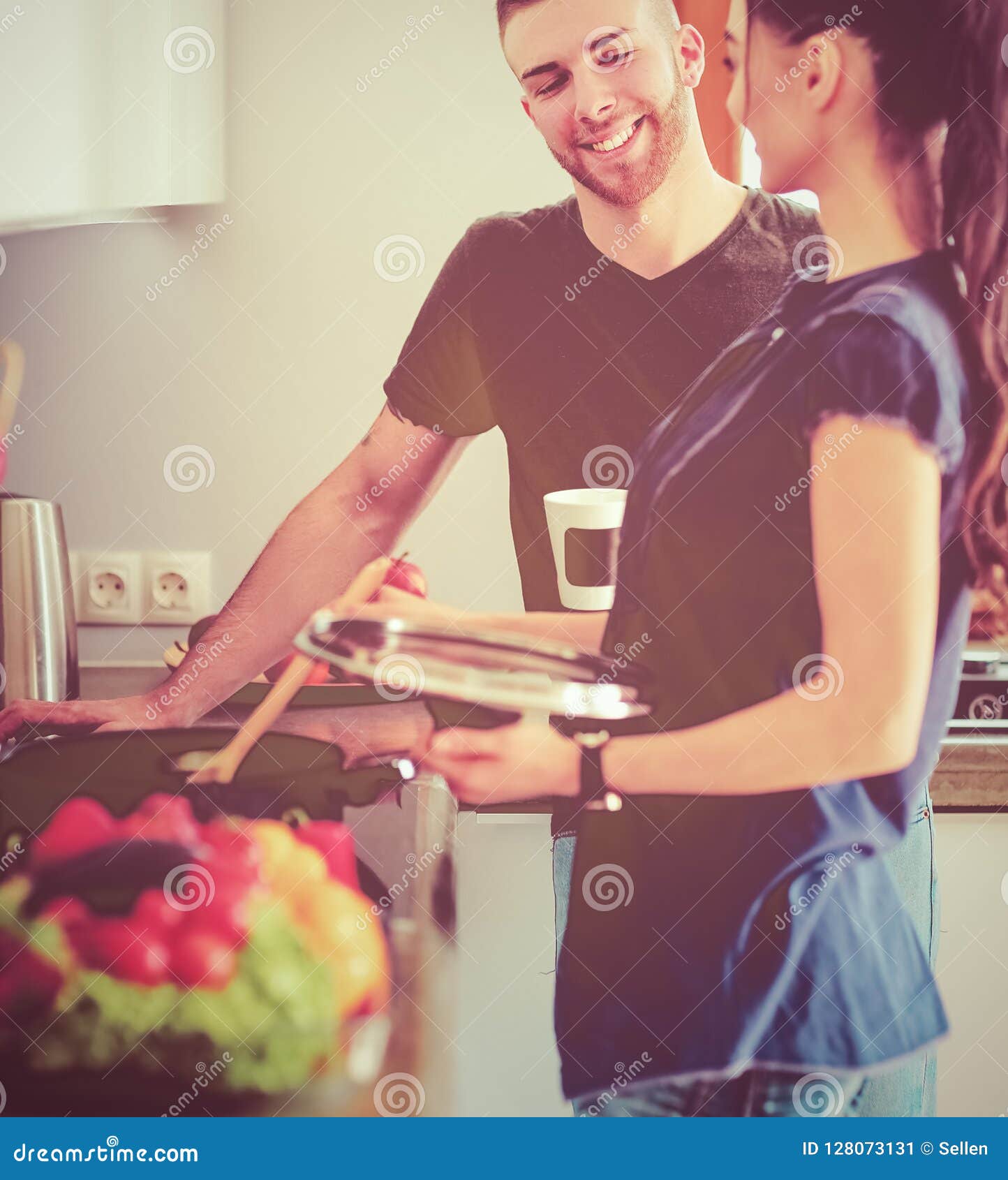 Couple Cooking Together in Their Kitchen at Home Stock Image - Image of ...