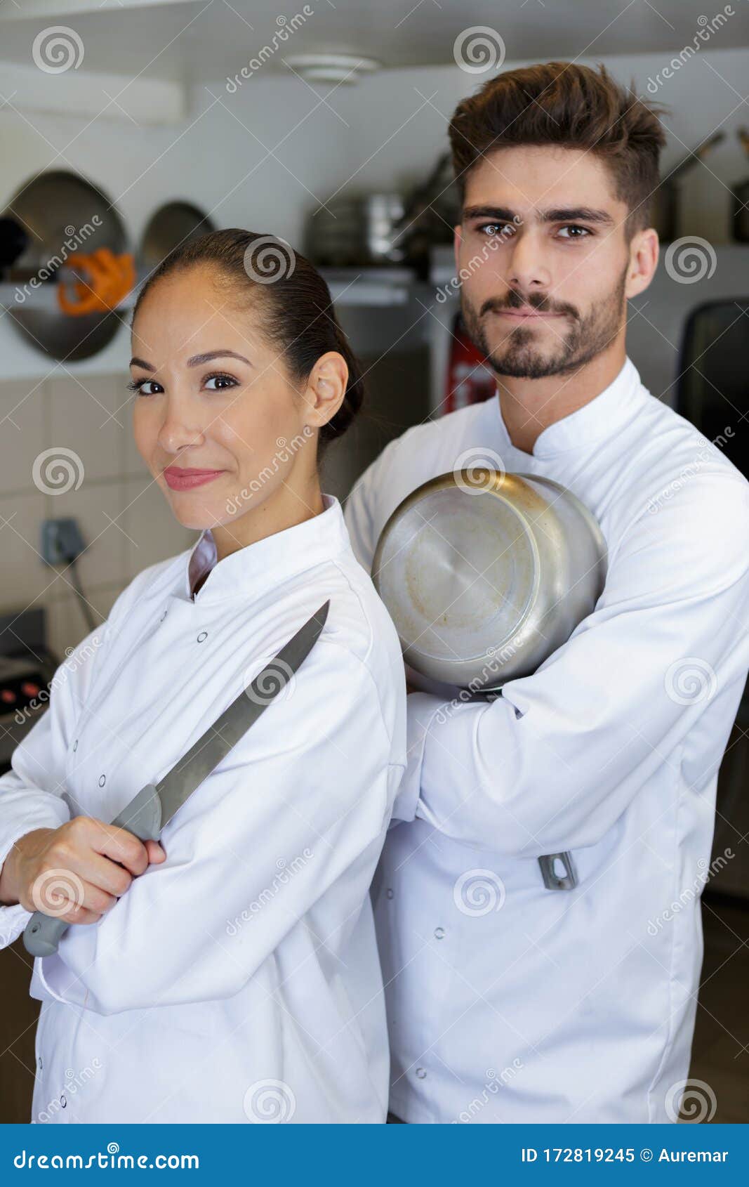 Couple cooks in kitchen stock image. Image of chefs - 172819245