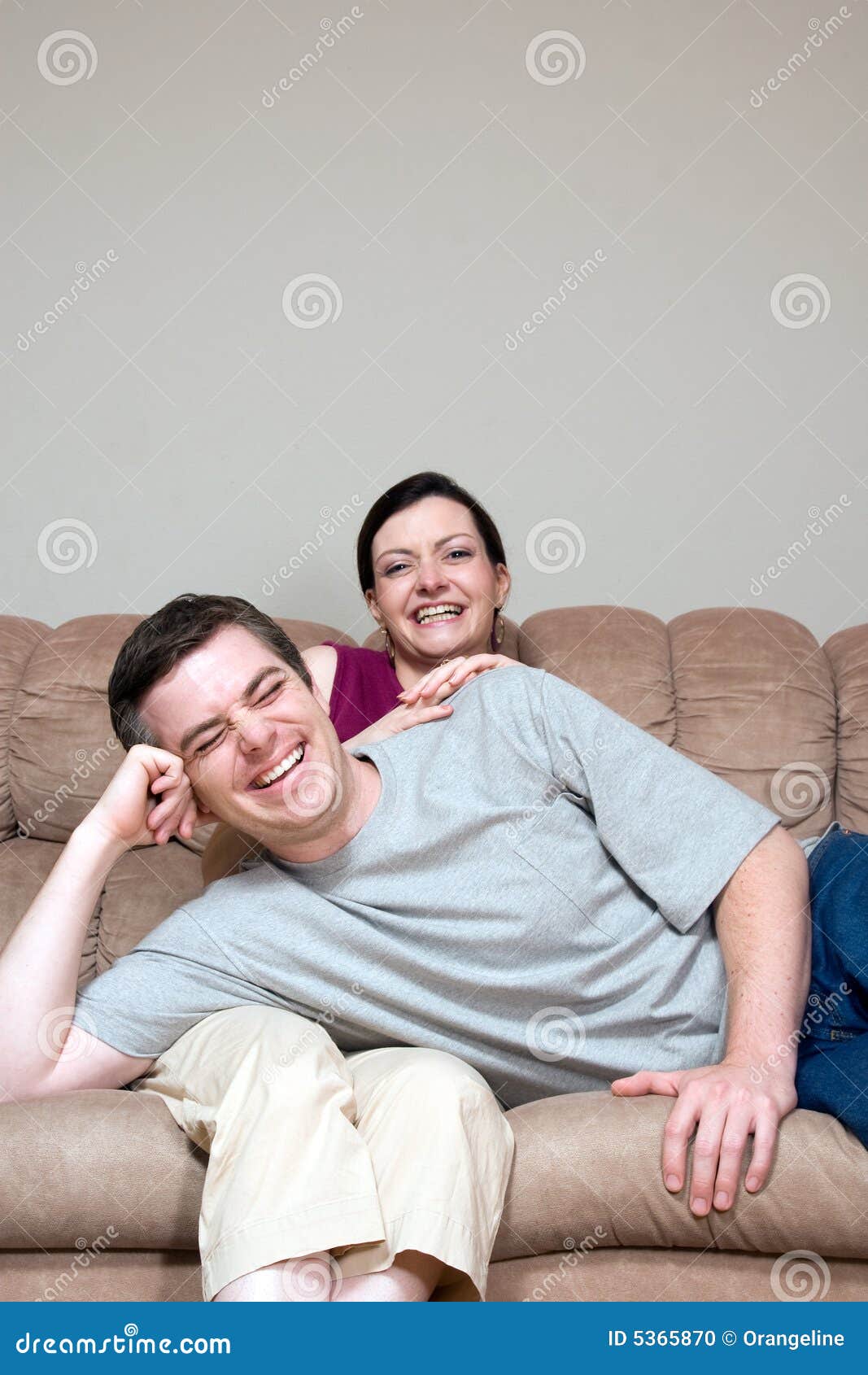 Couple on the Couch - Vertical Stock Photo - Image of loving, domestic ...