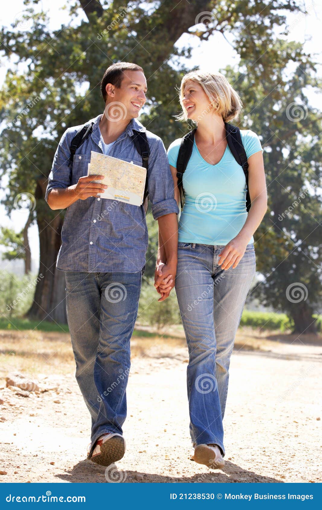 Couple on a Country Walk Using a Map Stock Photo - Image of enjoying ...