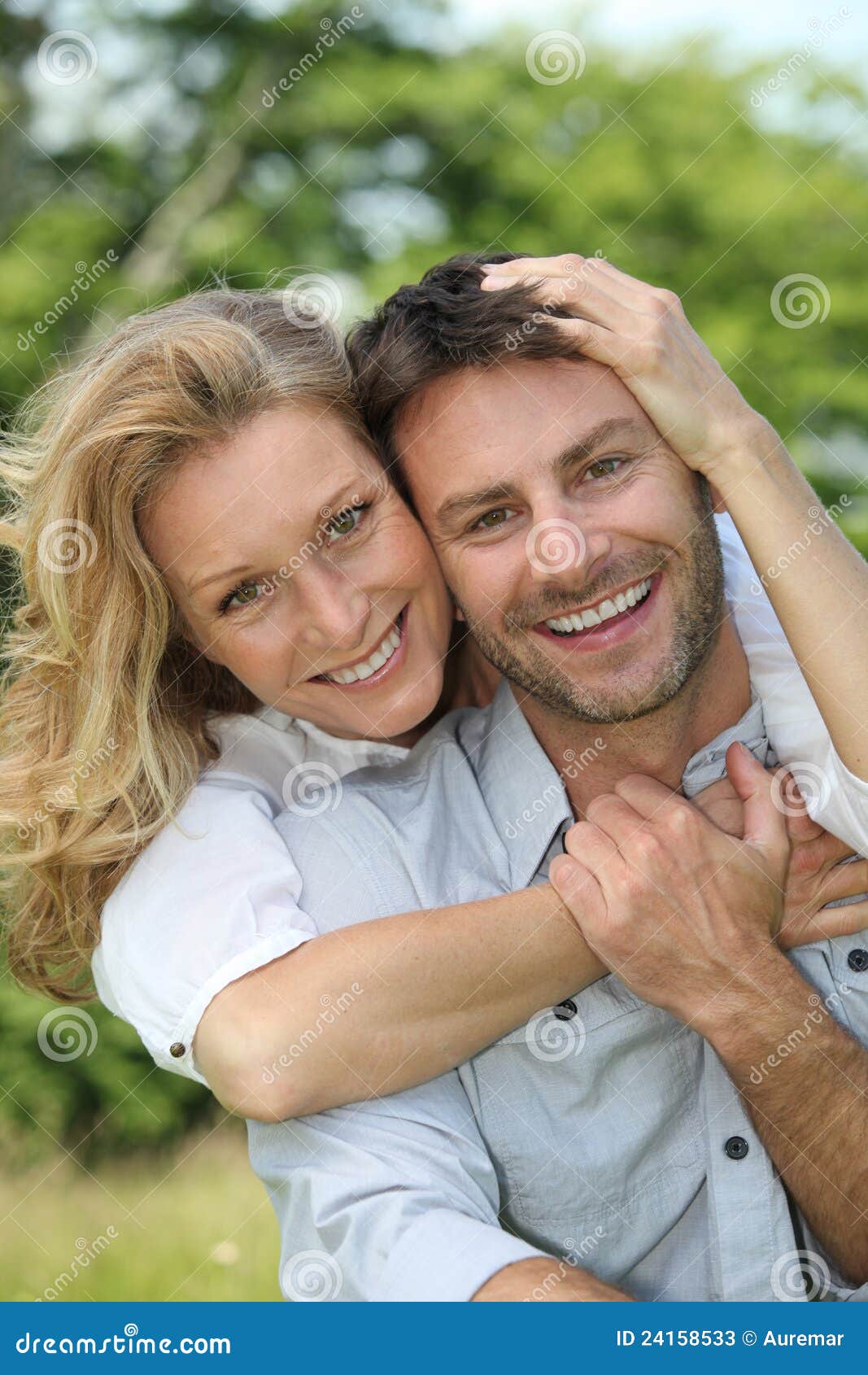 Couple in the countryside stock image. Image of field - 24158533