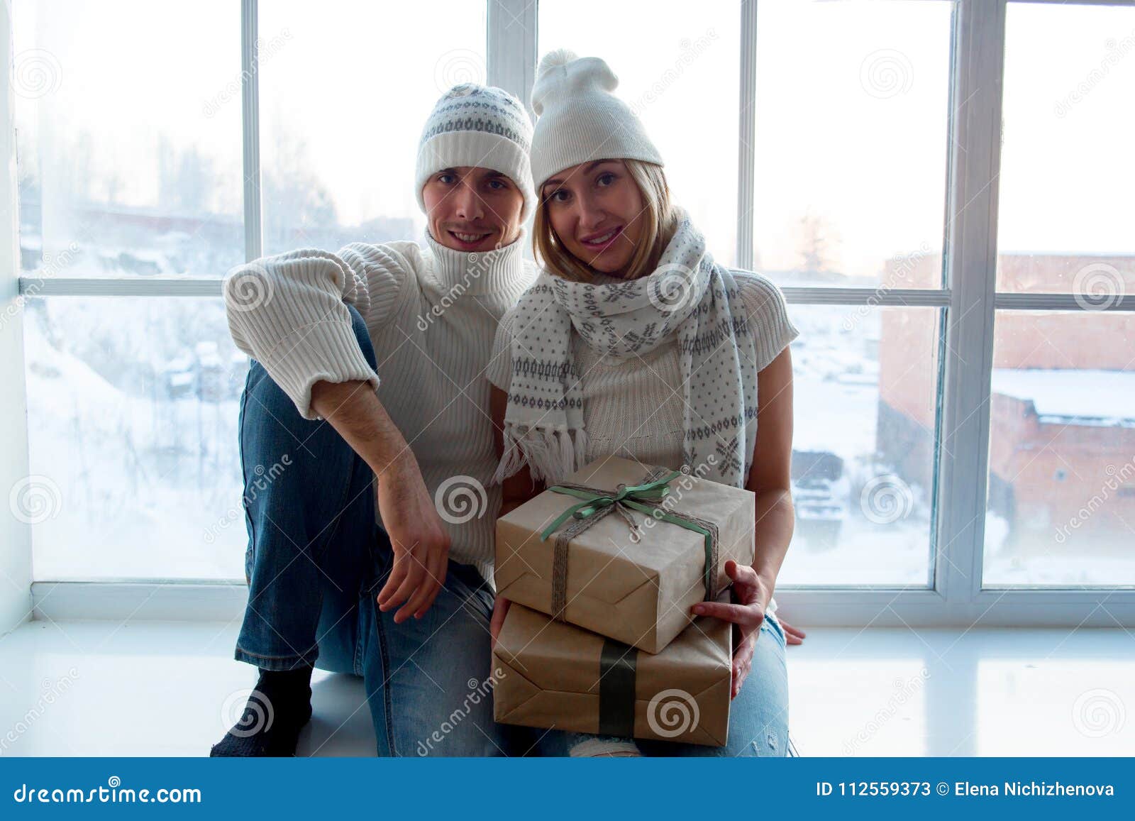 Couple cuddling together stock image. Image of laughing - 112559373