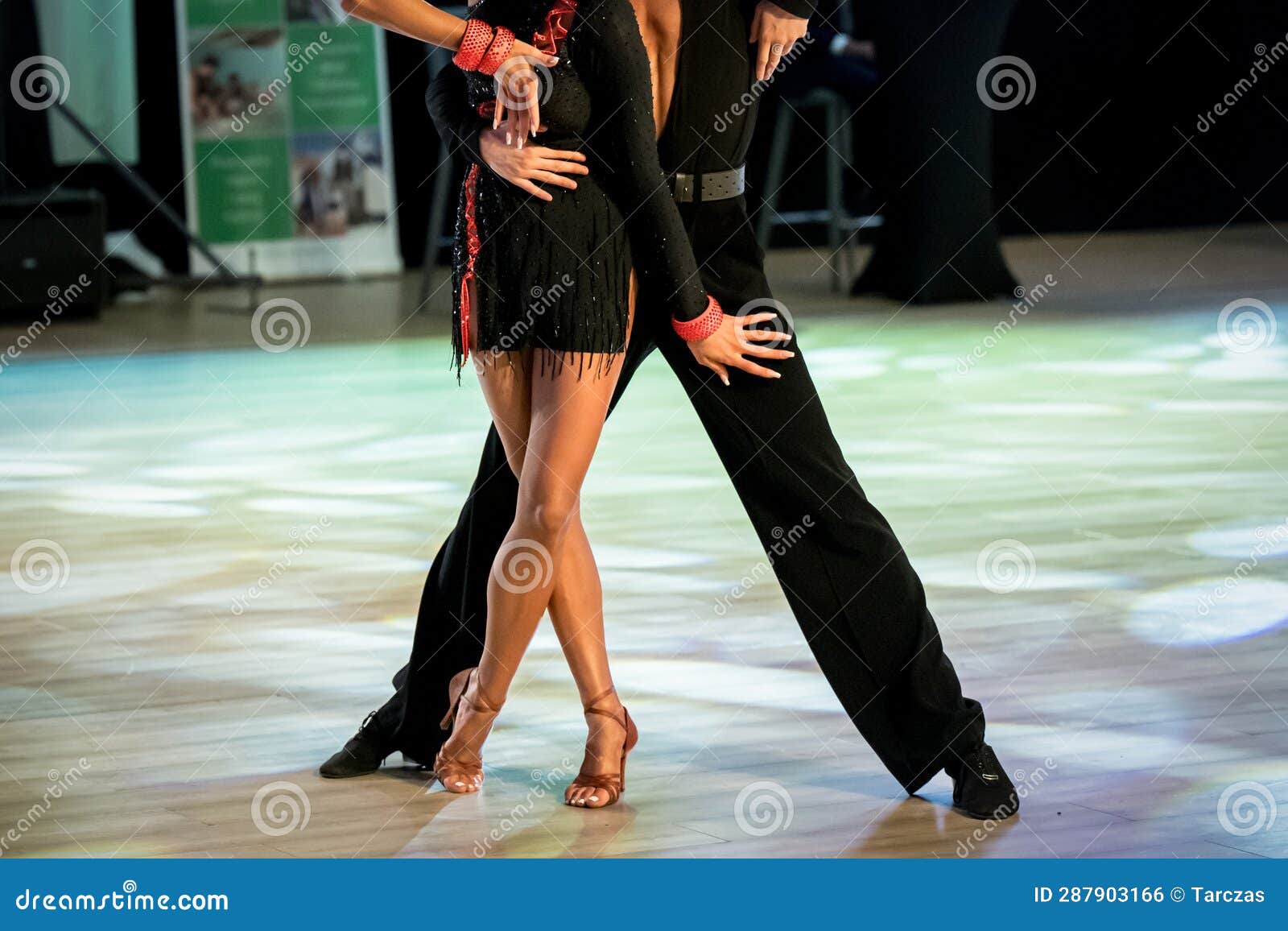 A Couple Dance a Latin Dance. the Legs of a Dancing Couple Stock Photo ...