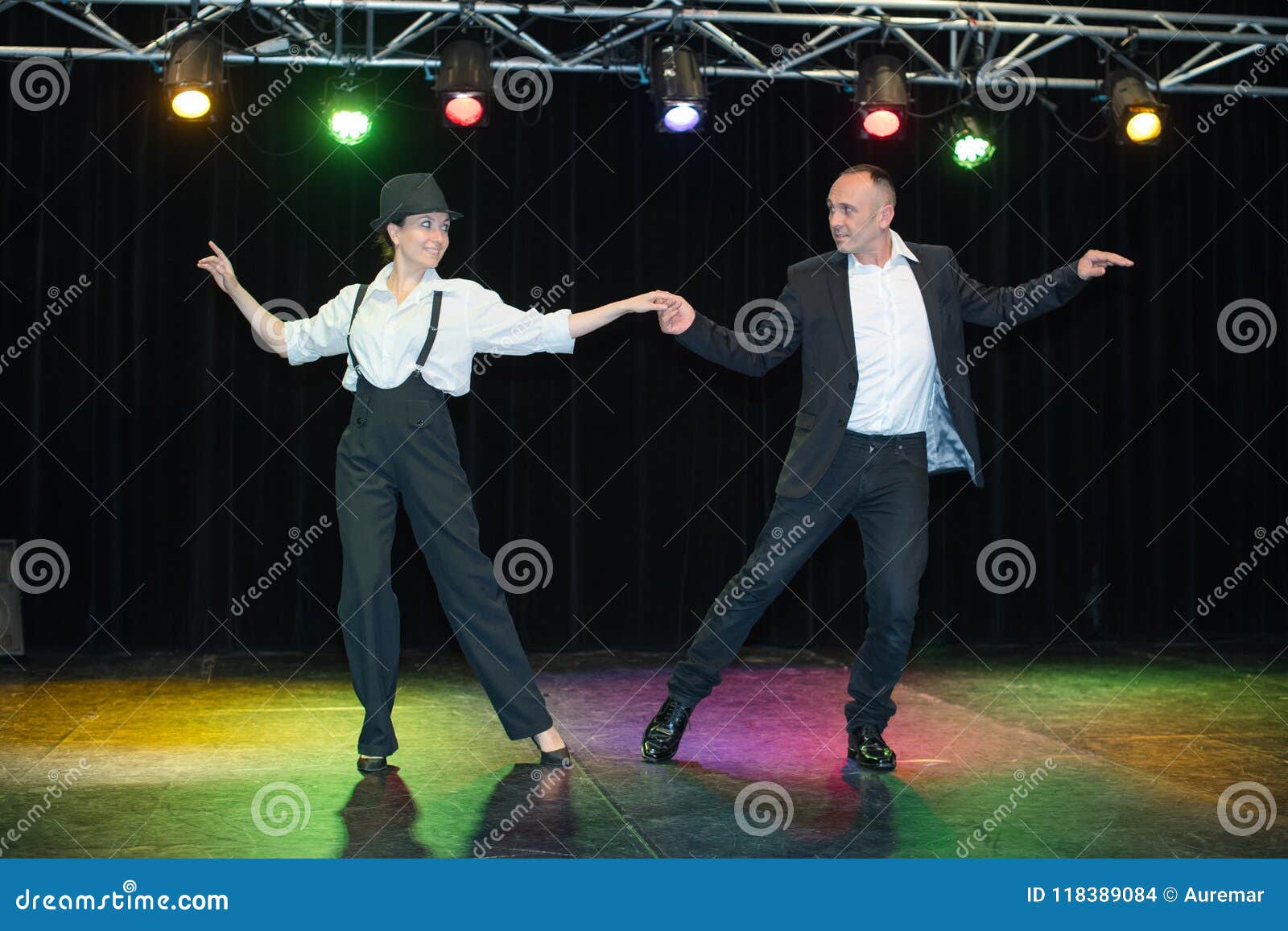 Couple dancing on stage stock photo. Image of beauty - 118389084