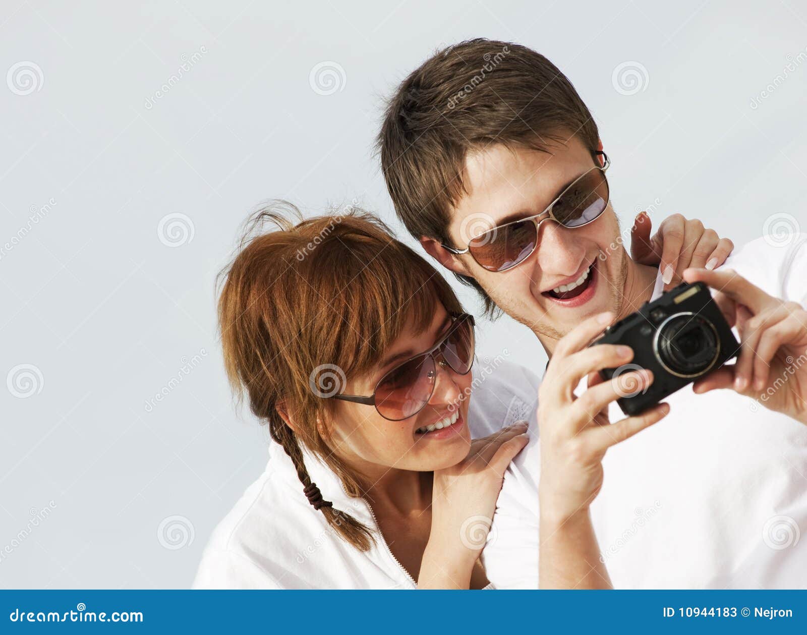 Couple with a Digital Camera Stock Image - Image of female, camera ...