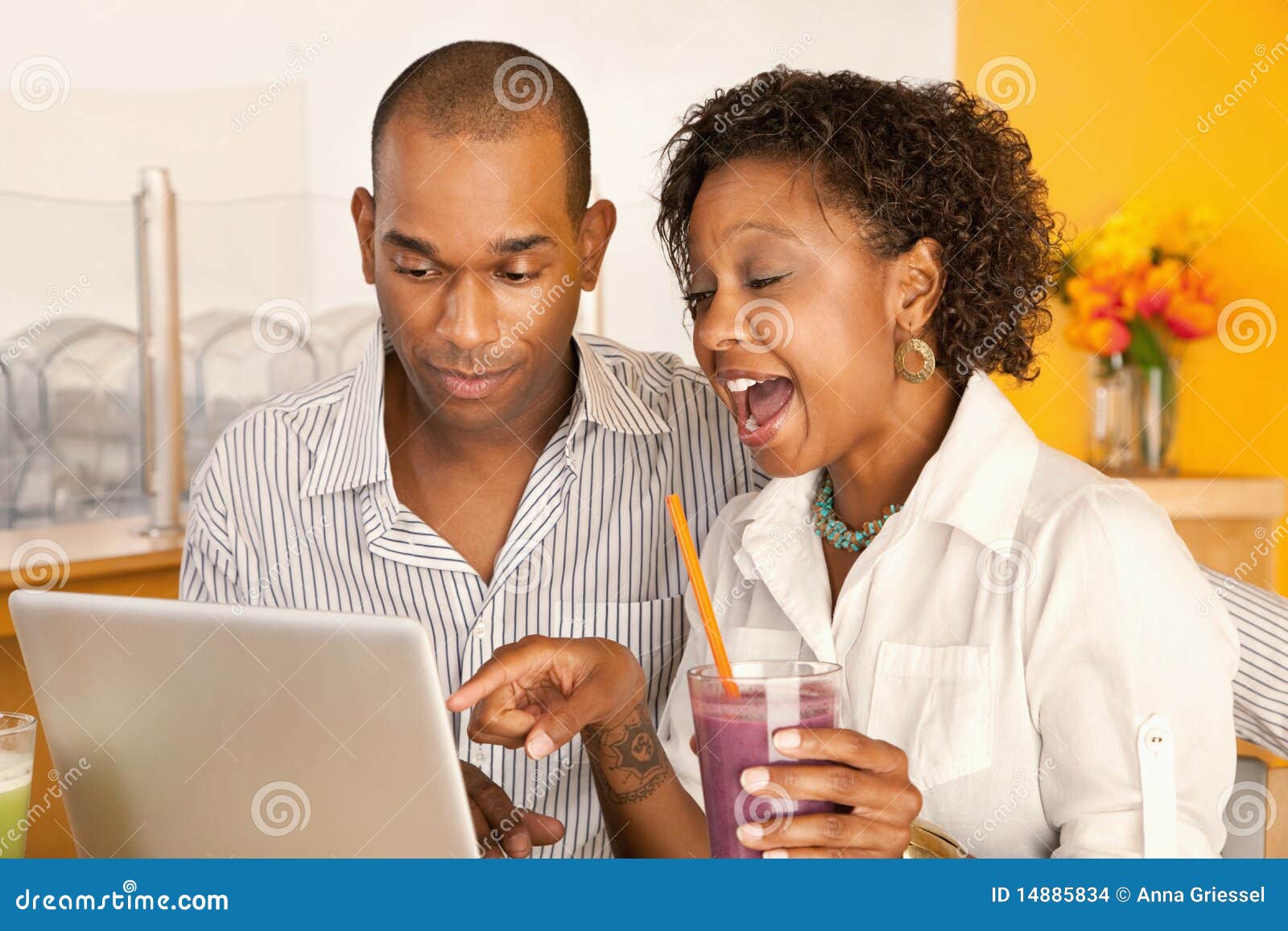 Couple Dining Out Using a Laptop Stock Photo - Image of camera, inside ...