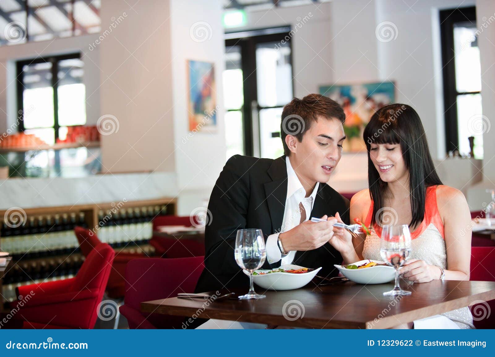 Couple Dining in Restaurant Stock Photo - Image of looking, meals: 12329622