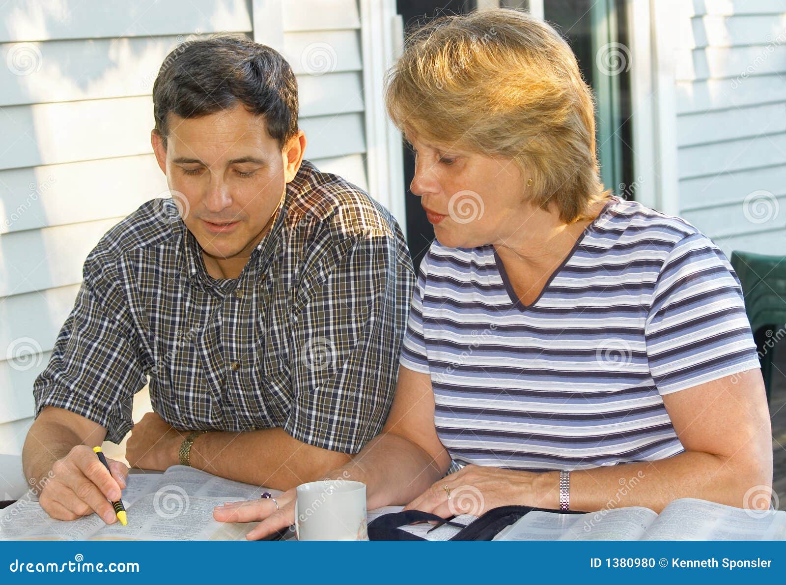 Couple doing Bible study stock photo. Image of togetherness - 1380980