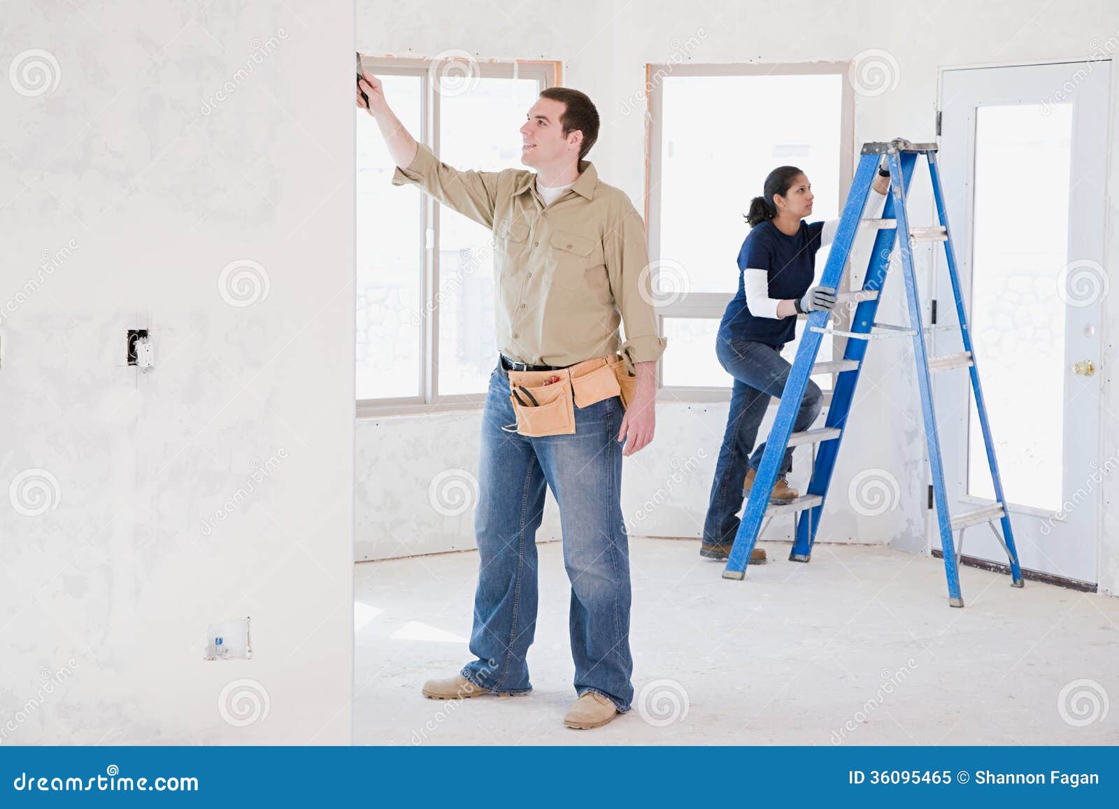 A Couple Doing Building Work Stock Image - Image of amuse, developing ...
