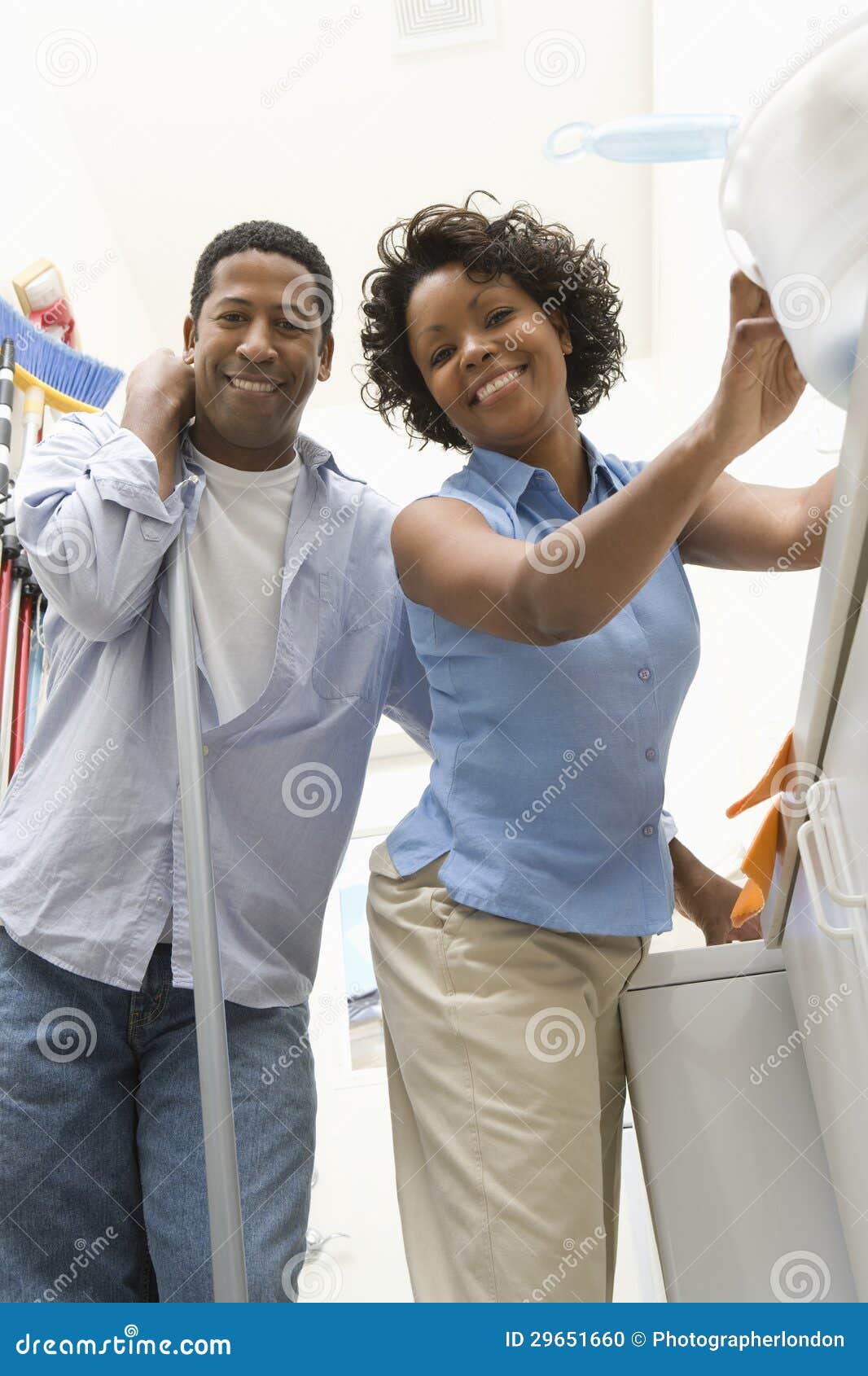 Couple Doing Household Chores Stock Photo - Image of male, mature: 29651660
