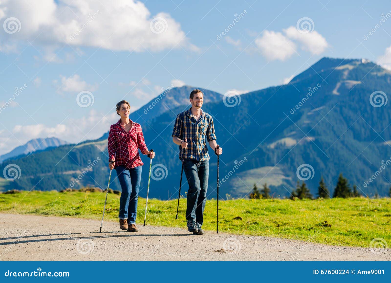 Couple Doing Nordic Walking Exercise in Mountains Stock Photo - Image ...