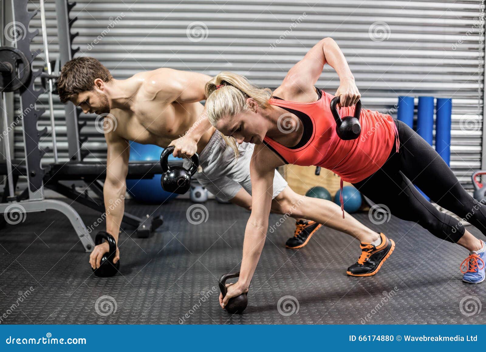 Couple Doing Push Up with Dumbbells Stock Photo - Image of muscle ...