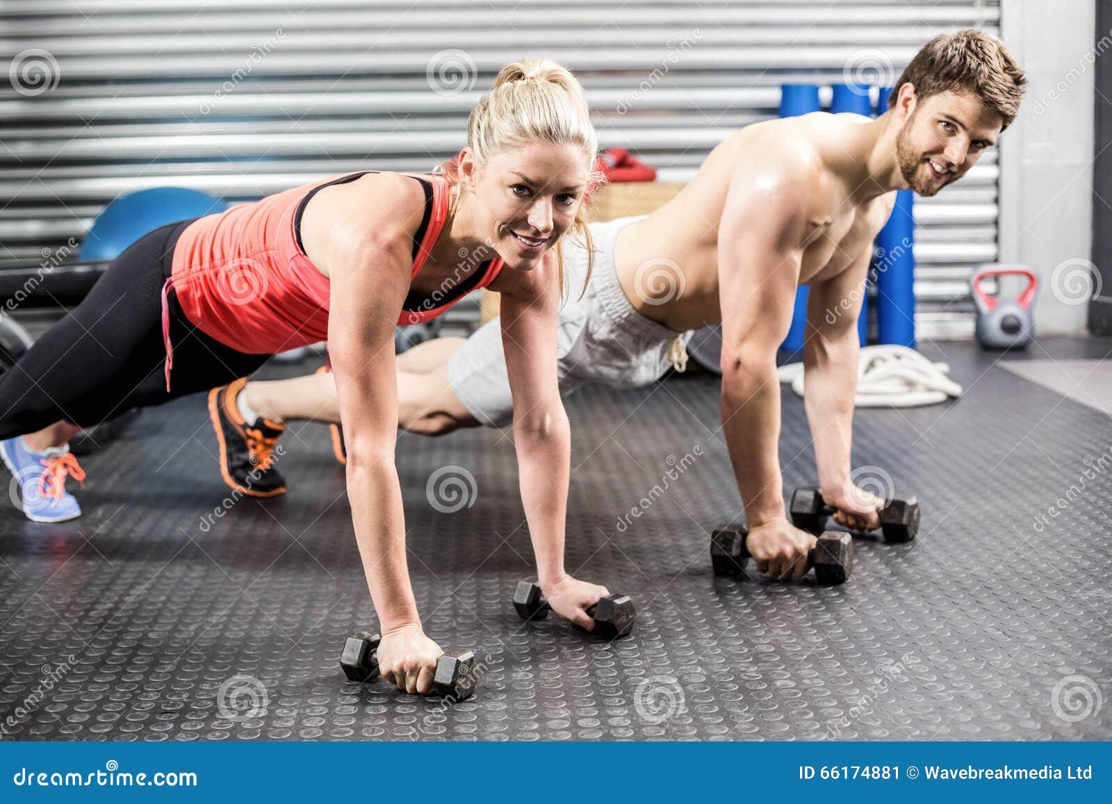 Couple Doing Push Up with Dumbbells Stock Image - Image of health, body ...