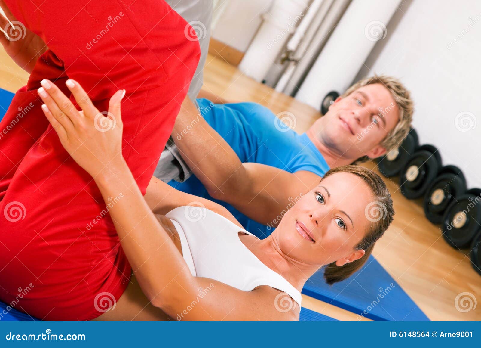 Couple doing Sit-ups stock photo. Image of together, girl - 6148564