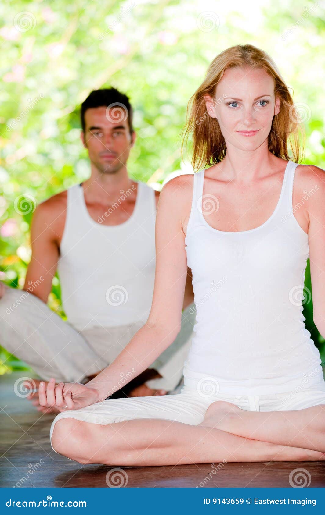 Couple doing yoga stock image. Image of person, together - 9143659