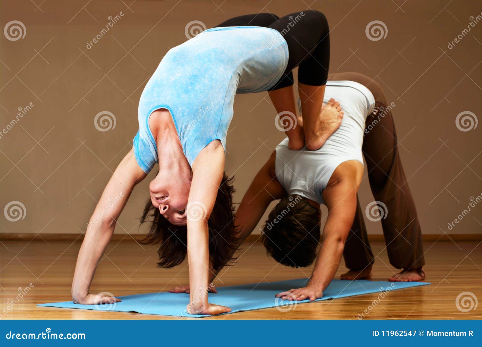Couple doing yoga practice stock image. Image of happy - 11962547