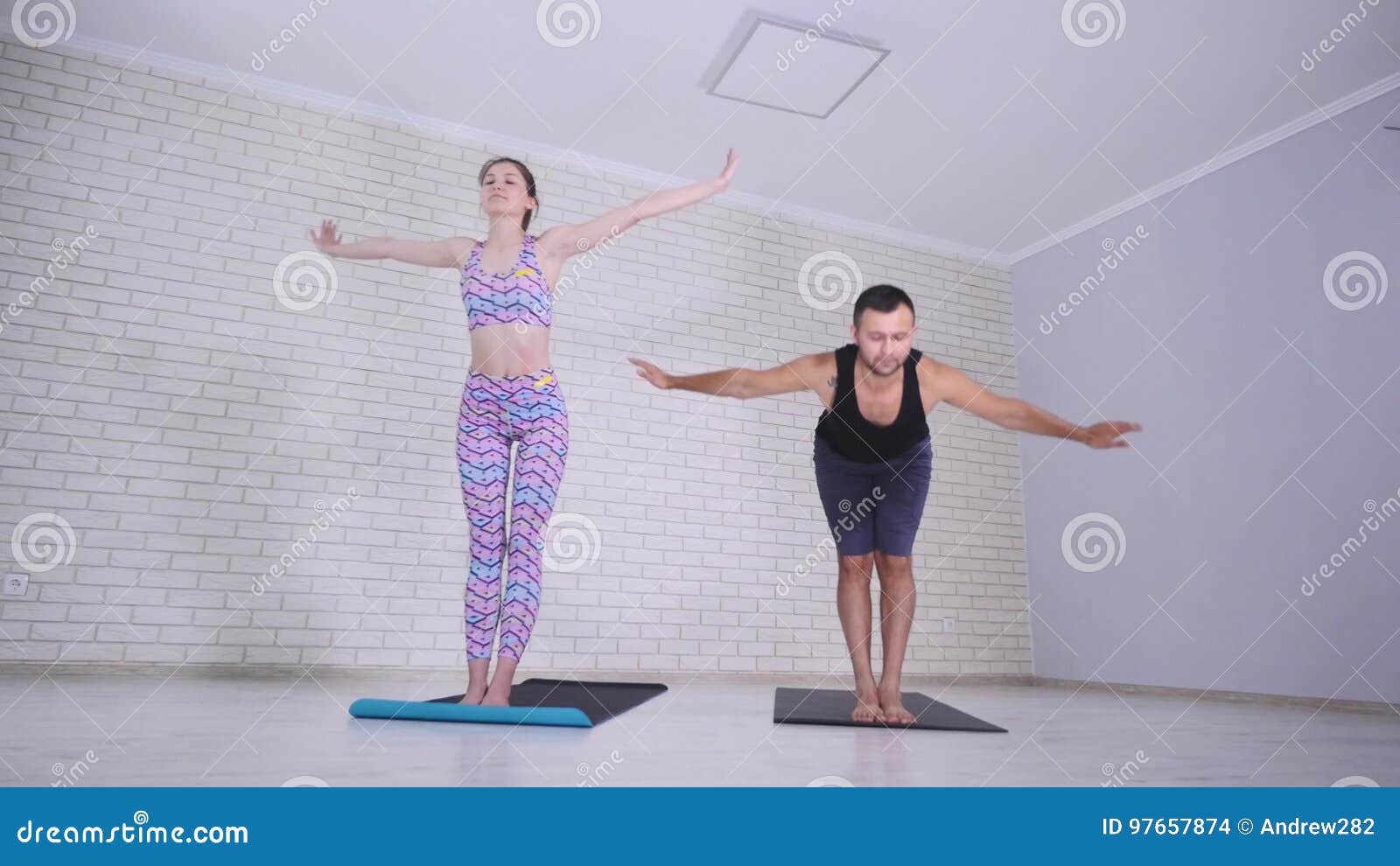 Couple Doing Yoga Together in the Studio Stock Photo - Image of highdef ...