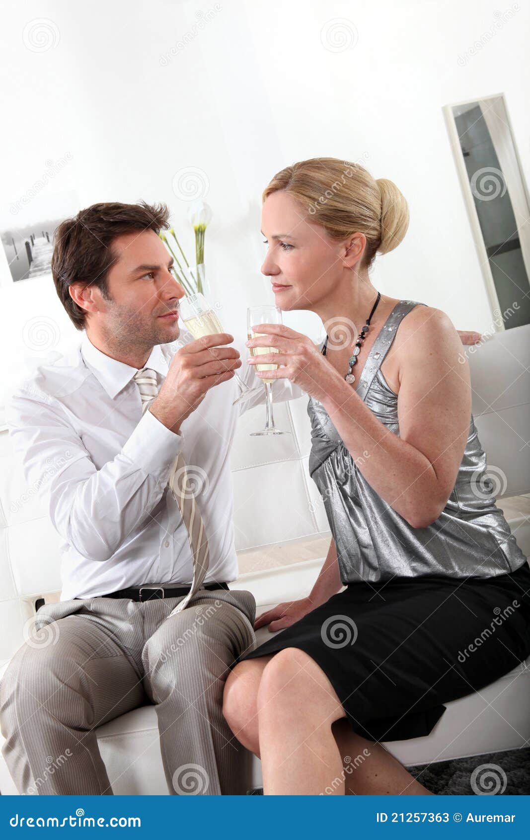 Couple drinking champagne stock image. Image of adults - 21257363
