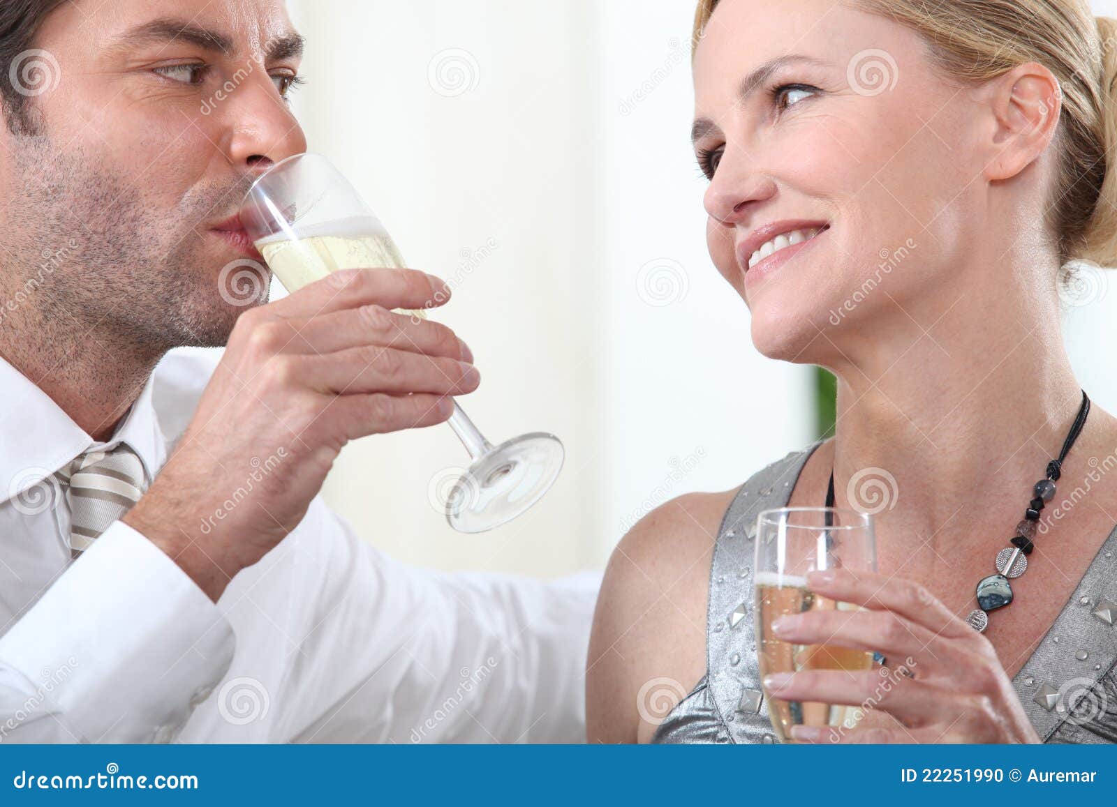 Couple drinking champagne stock photo. Image of celebrating - 22251990