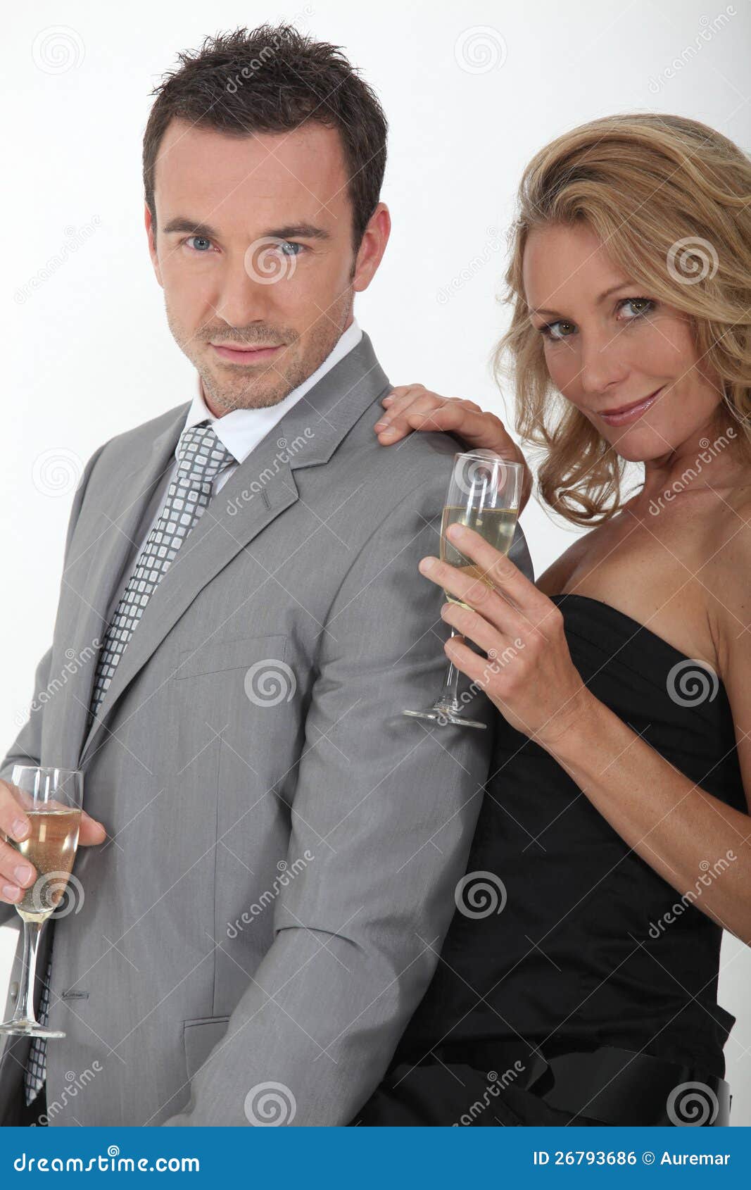 Couple drinking champagne stock photo. Image of dress - 26793686