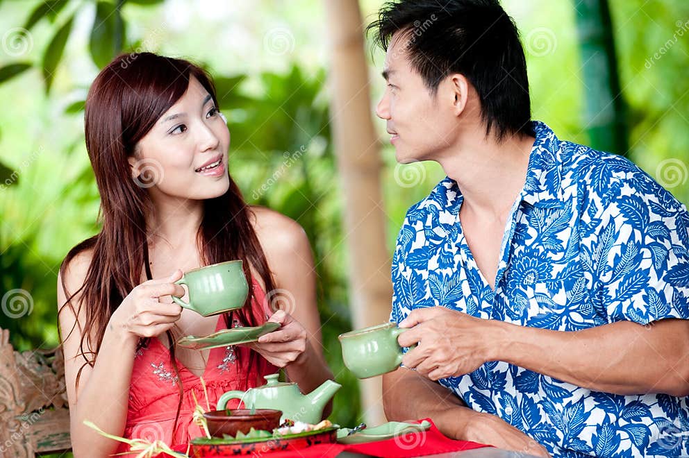 Couple Drinking Tea stock image. Image of good, tropical - 9244549