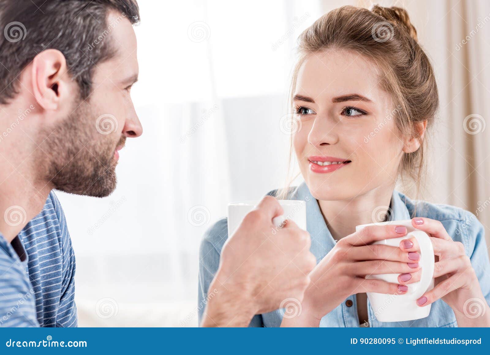 Couple drinking tea stock image. Image of mugs, women - 90280095