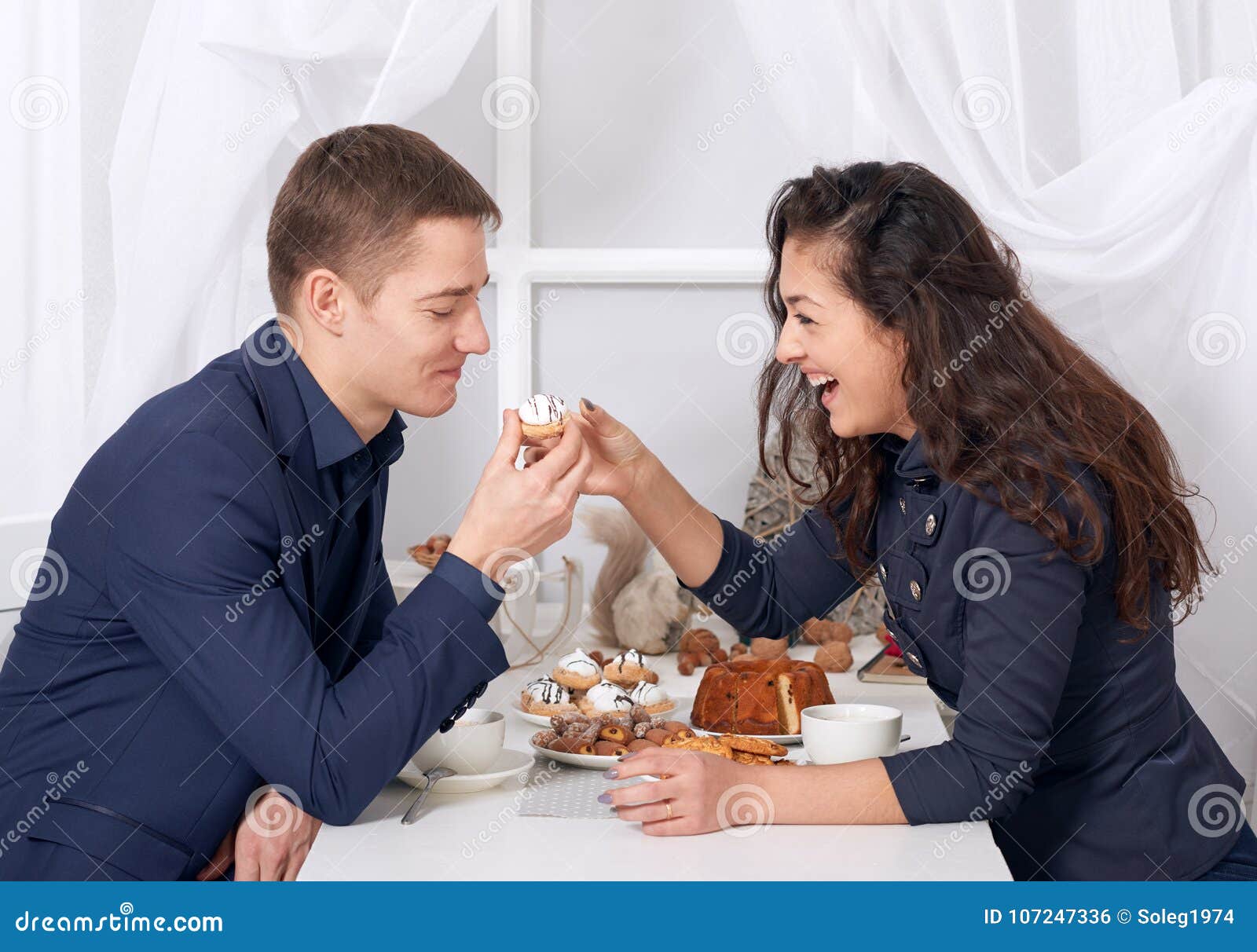 Couple Drinking Tea and Talking in the Room Stock Photo - Image of ...