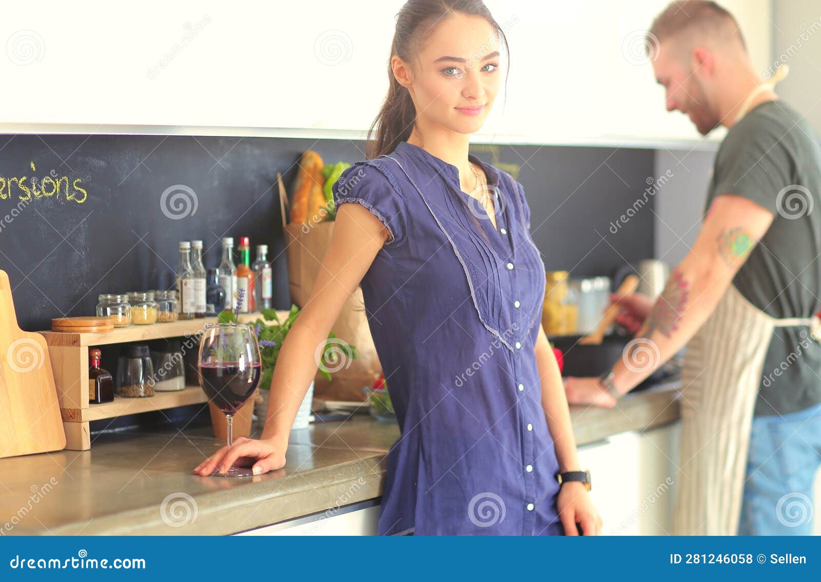 Couple Drinking Wine while Cooking in the Kitchen Stock Photo - Image ...