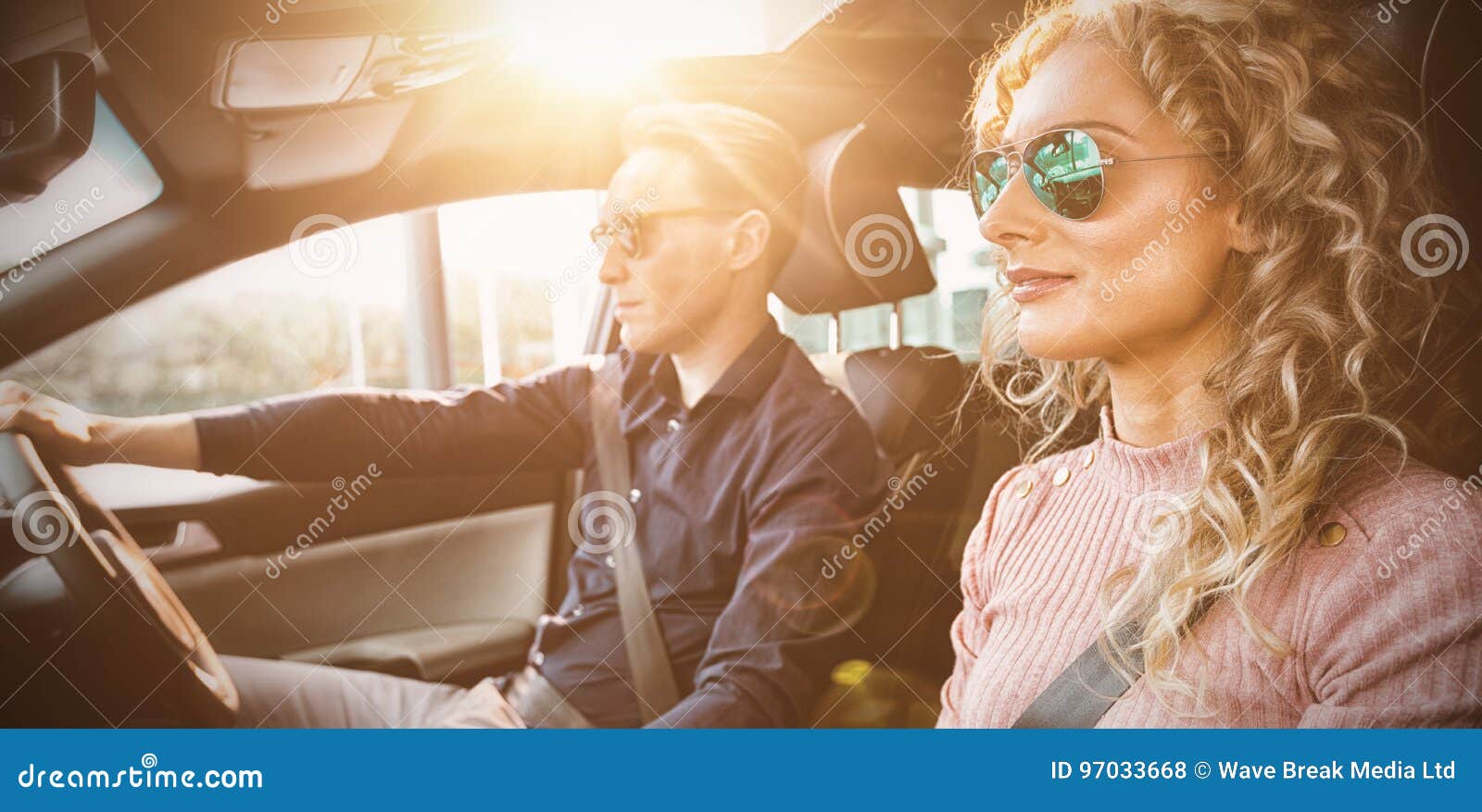 Couple Doing Test Drive in Car Stock Photo - Image of bright, back ...