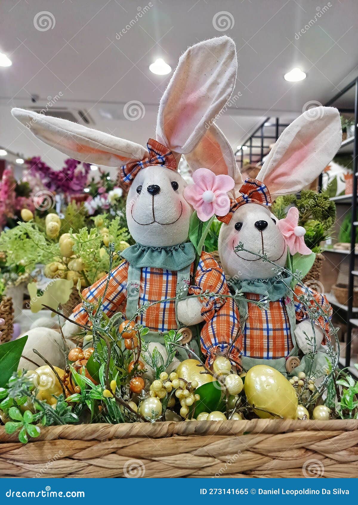 Couple Of Rabbits And Their Young Easter Bunnies Resting In A Garden ...