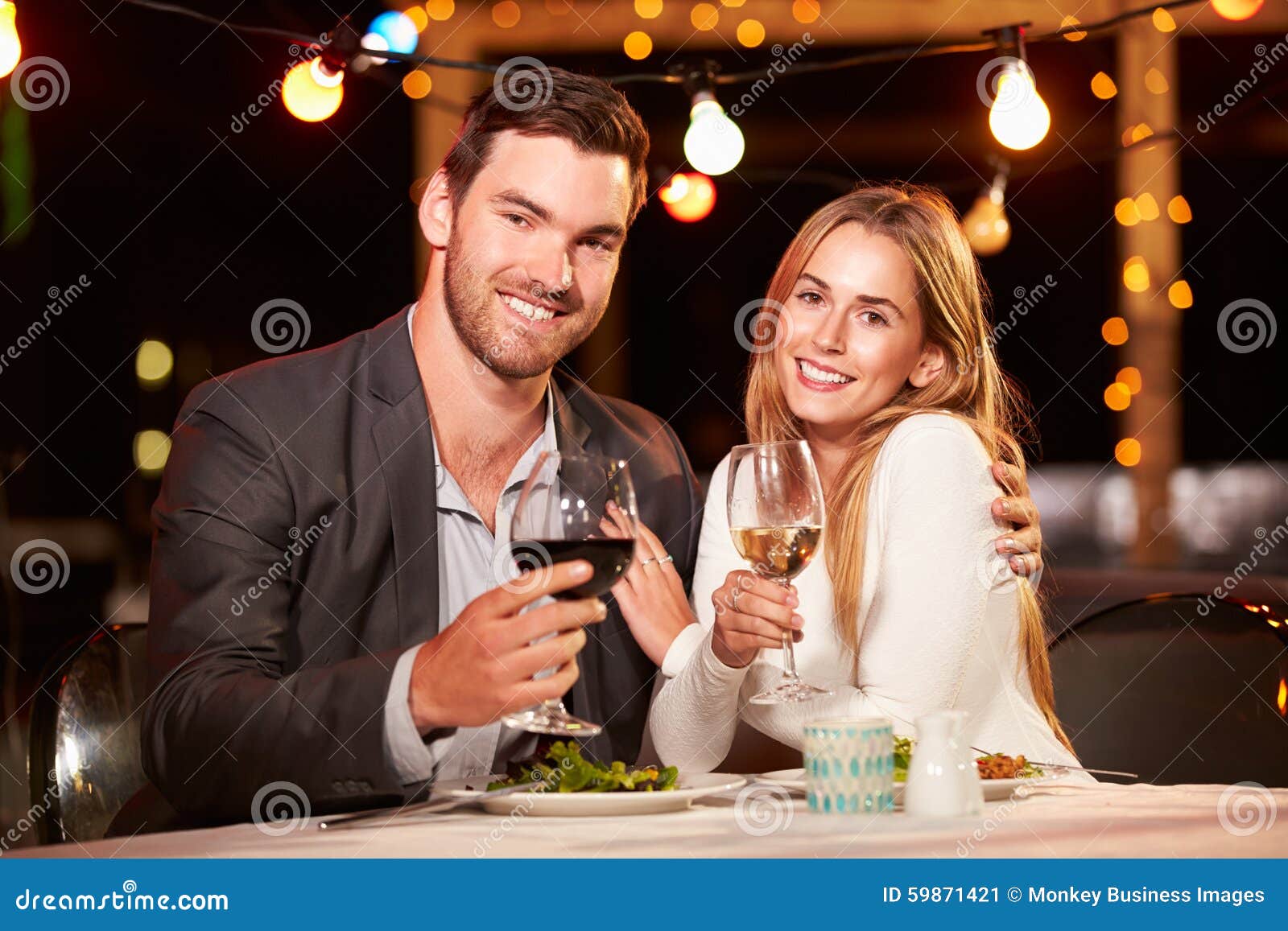 Couple Eating Dinner at Rooftop Restuarant Stock Image - Image of ...
