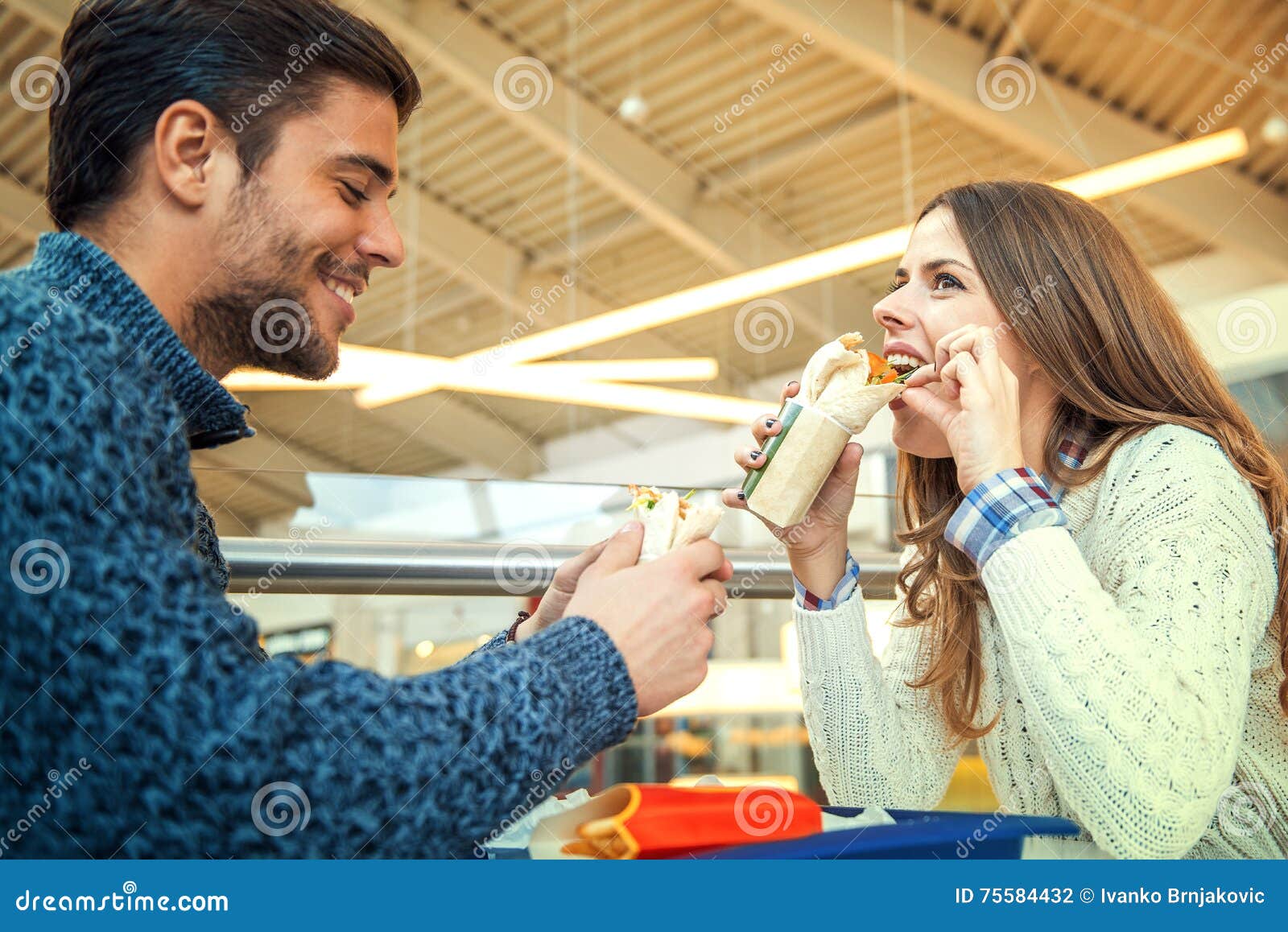 Couple Eating in Fast Food Restaurant Stock Photo - Image of city, meal ...