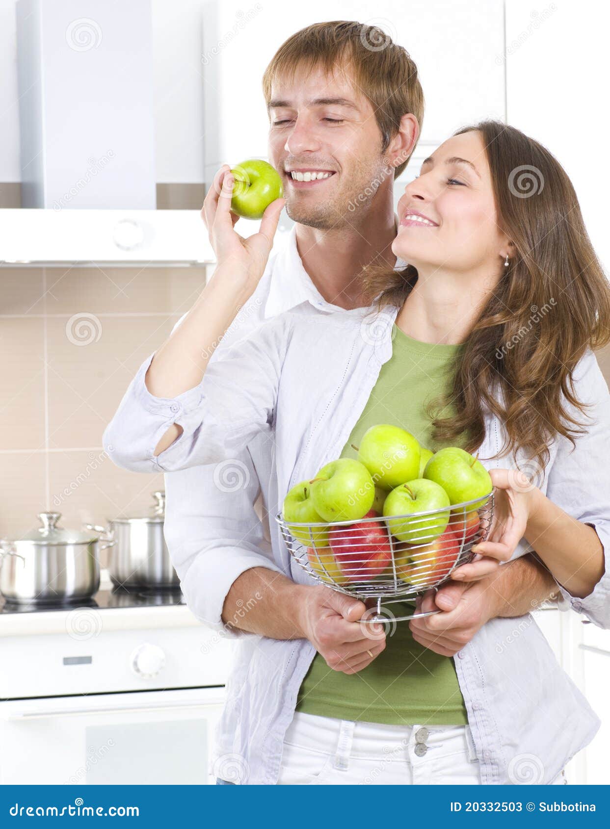 Couple Eating fresh fruits stock image. Image of kitchen - 20332503