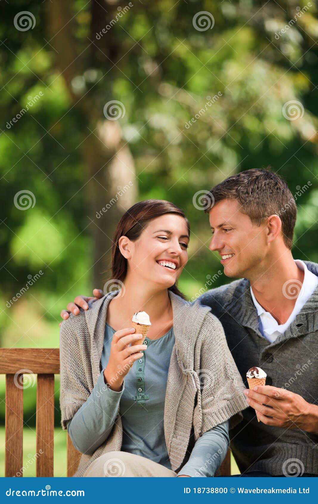 Couple eating an ice cream stock photo. Image of single - 18738800