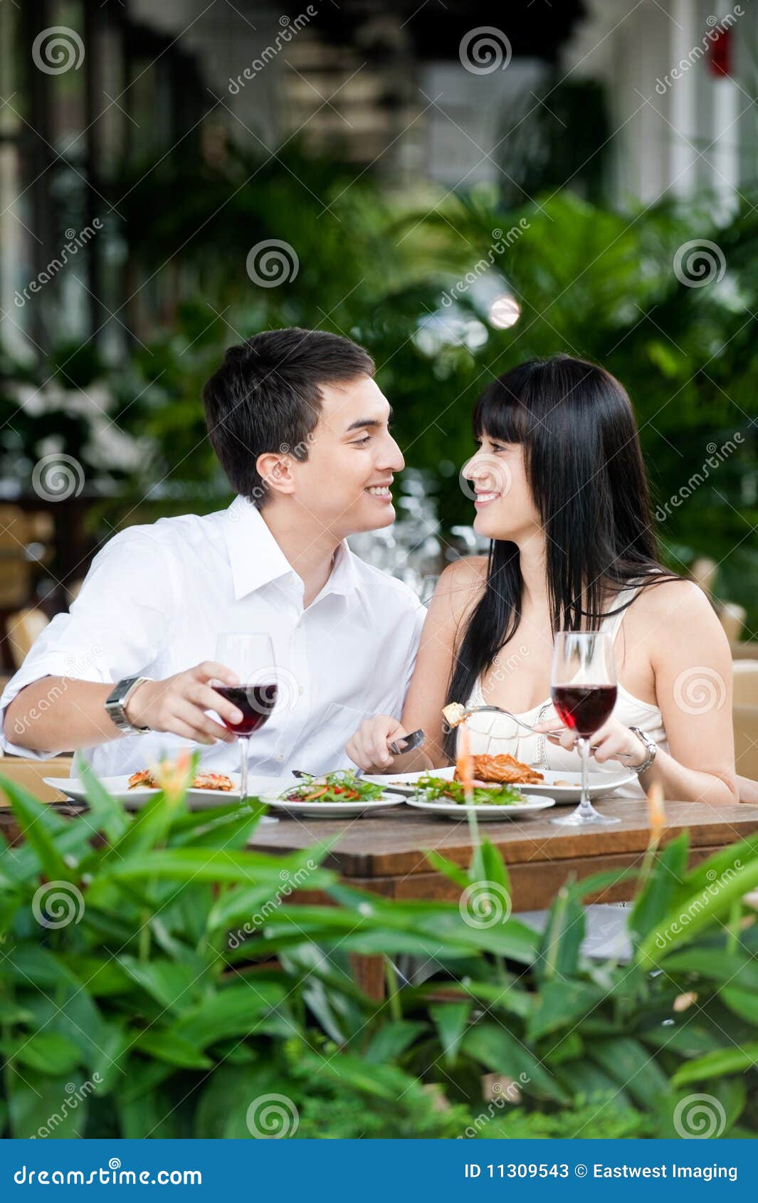 Couple Eating Outdoors stock image. Image of beautiful - 11309543