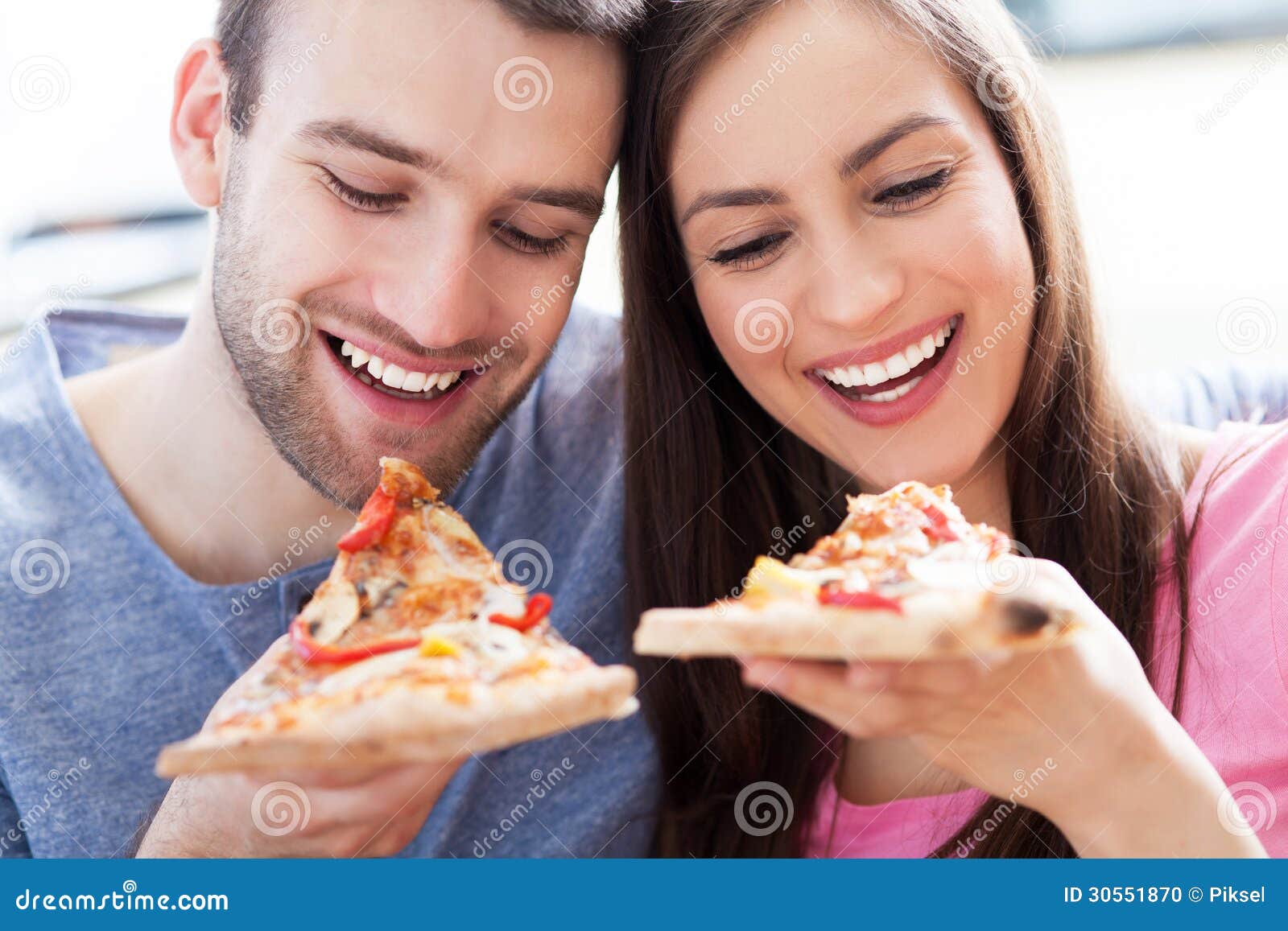Couple eating pizza stock photo. Image of apartment, happy - 30551870