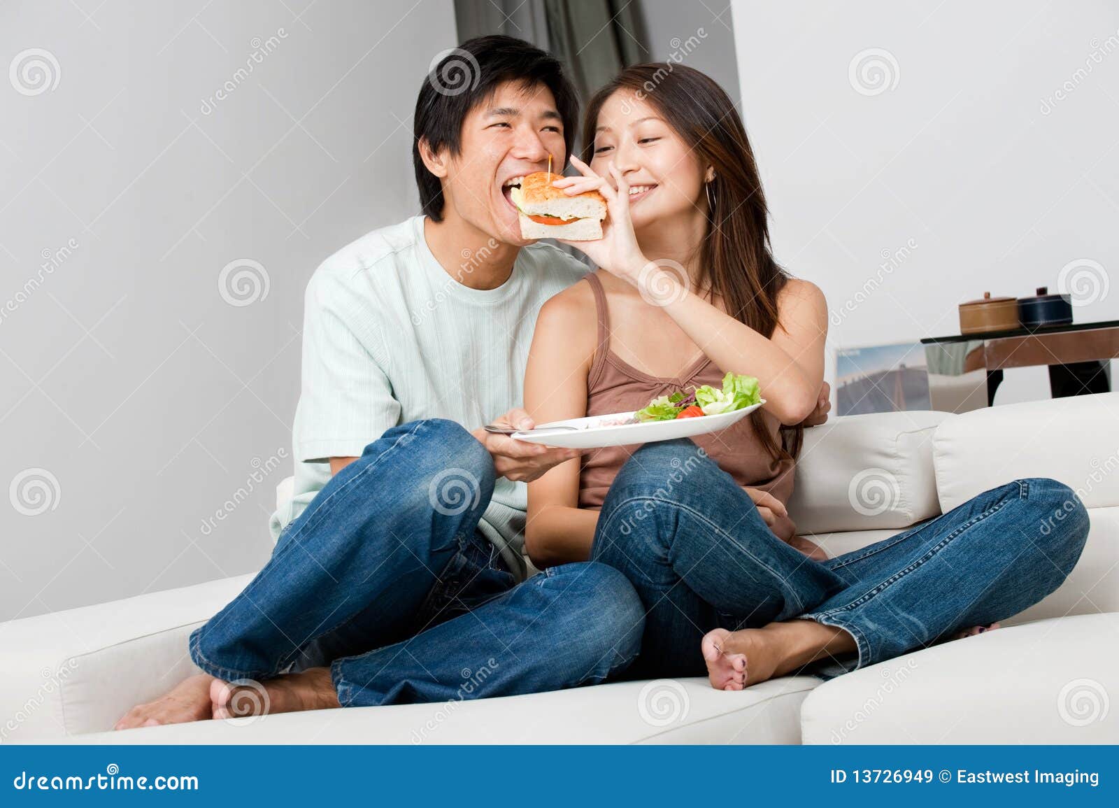 Couple Eating Together stock image. Image of looking - 13726949