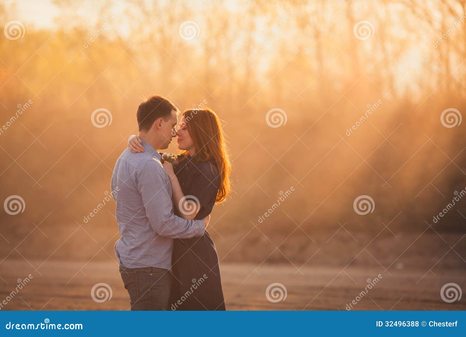 Couple Embracing Standing on the Road in the Dust Stock Photo - Image ...