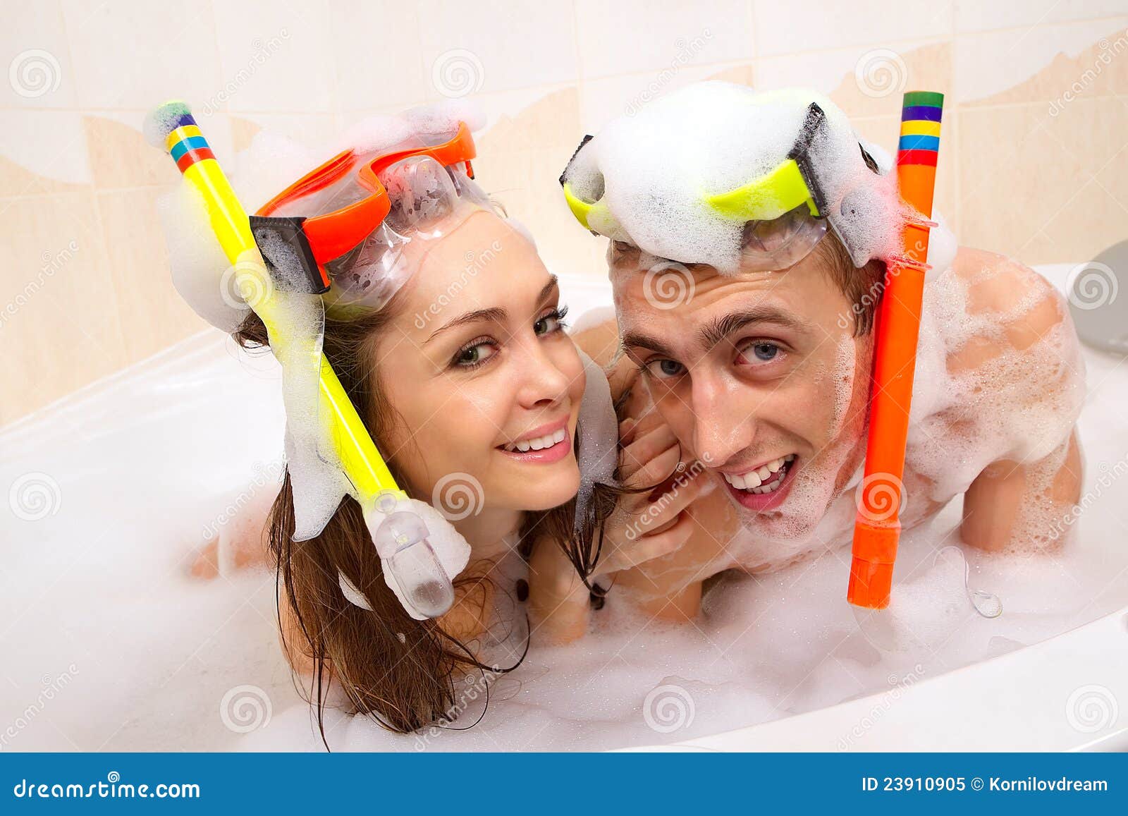 Couple is enjoying a bath stock image. Image of fins - 23910905