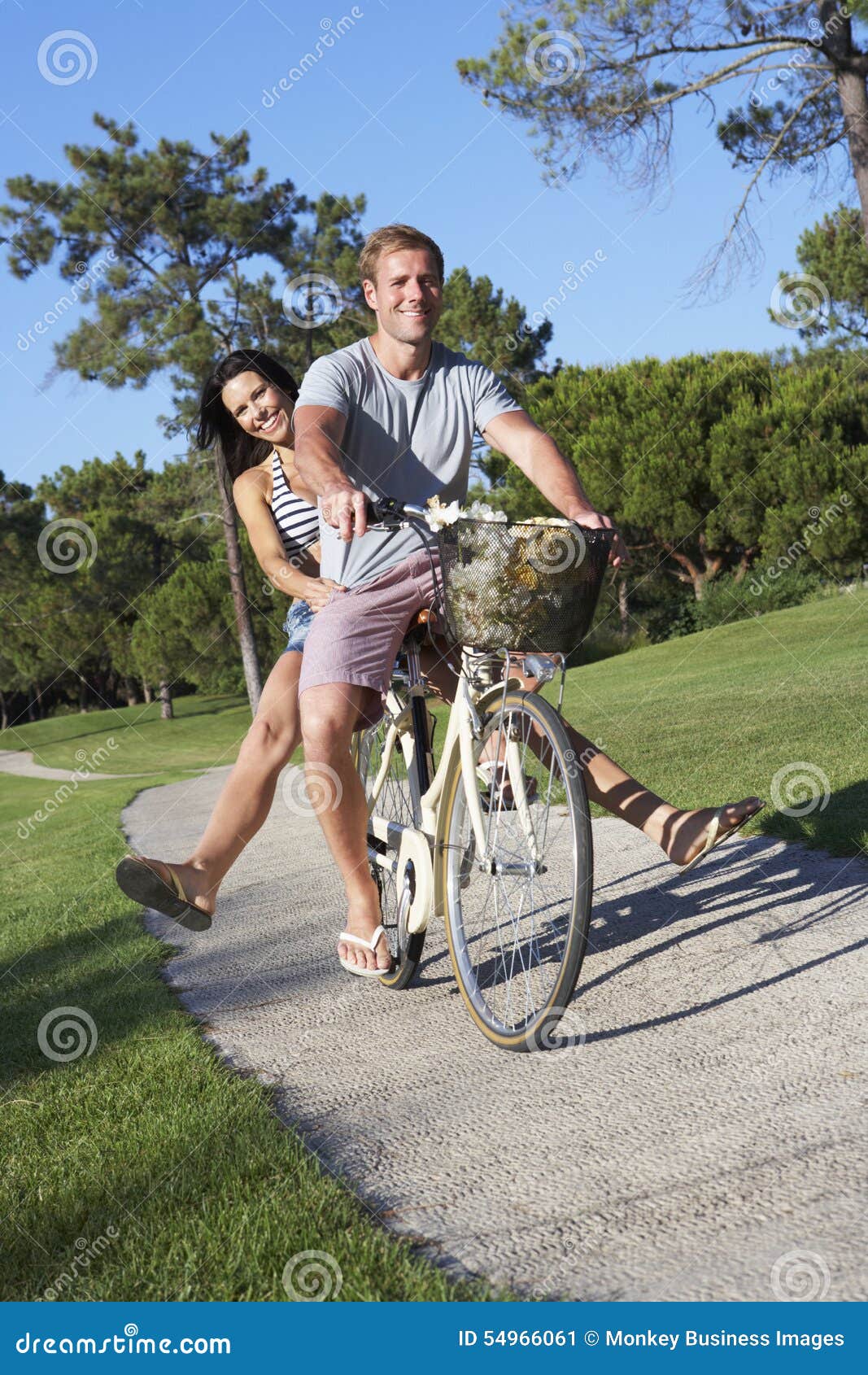 Couple Enjoying Cycle Ride stock image. Image of outdoors - 54966061