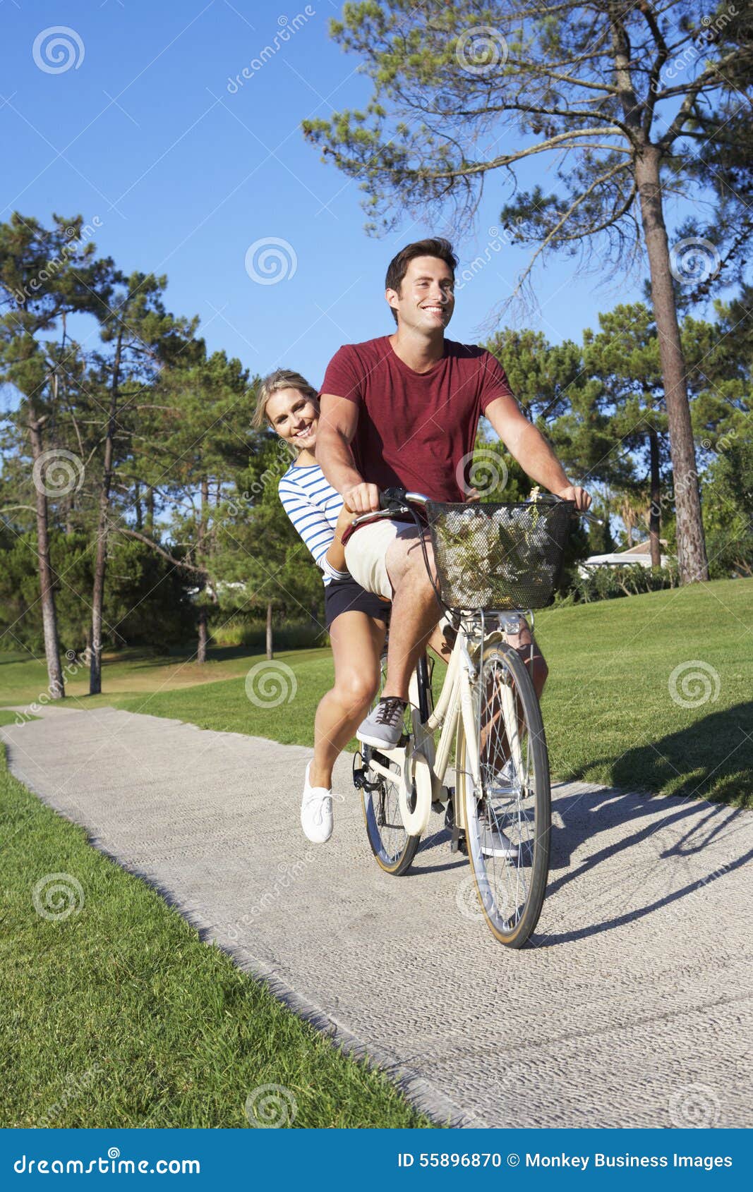 Couple Enjoying Cycle Ride stock photo. Image of outdoors - 55896870