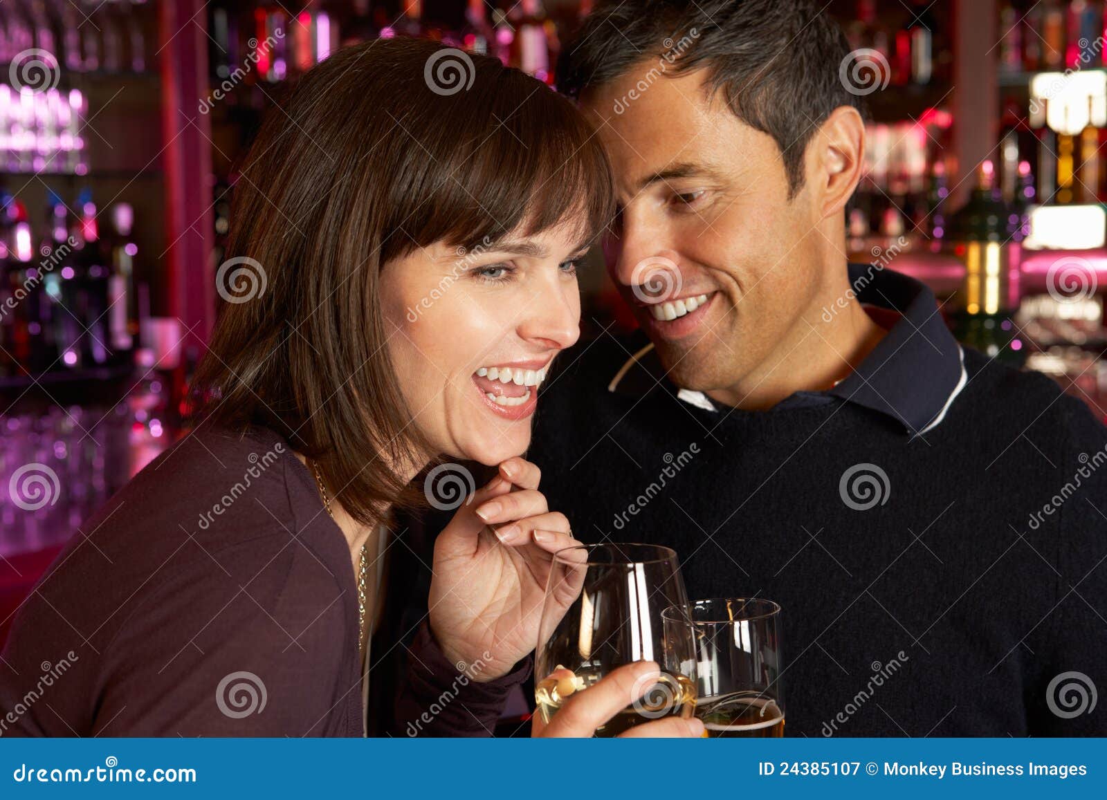 Couple Enjoying Drink Together in Bar Stock Image - Image of drink ...