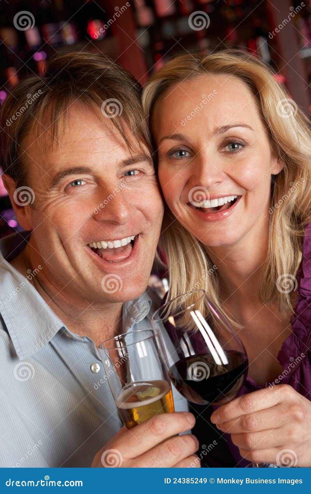 Couple Enjoying Drink Together in Bar Stock Image - Image of laughter ...
