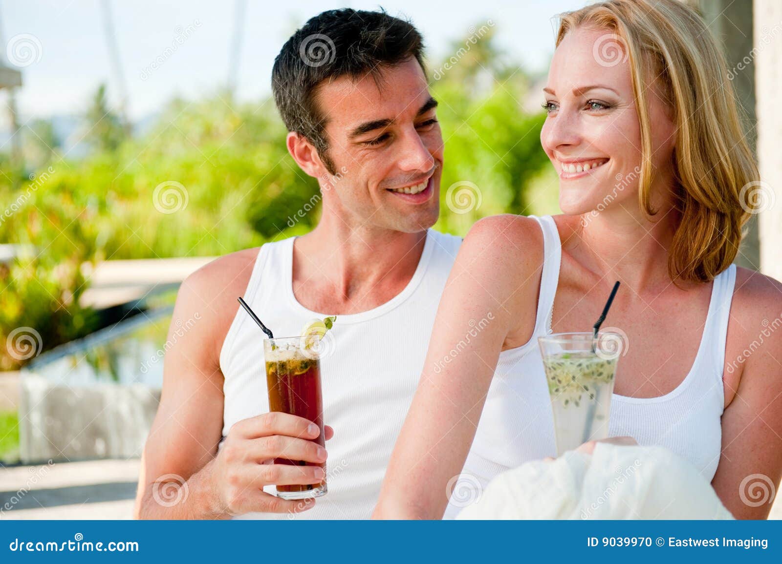 Couple Enjoying Drinks stock photo. Image of relax, morning - 9039970