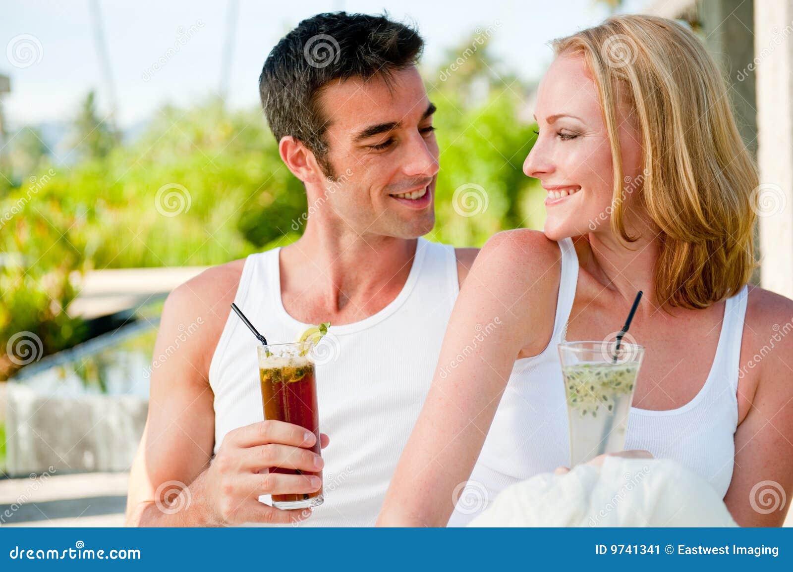 Couple Enjoying Drinks stock image. Image of pretty, glass - 9741341