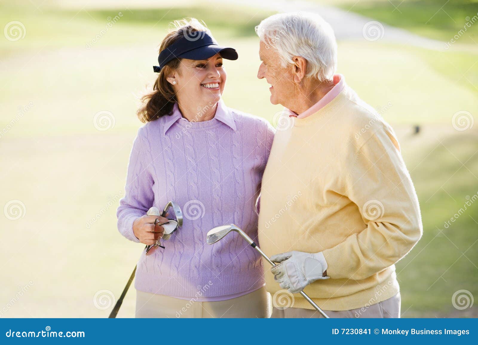 Couple Enjoying a Game of Golf Stock Image - Image of fifties, sport ...