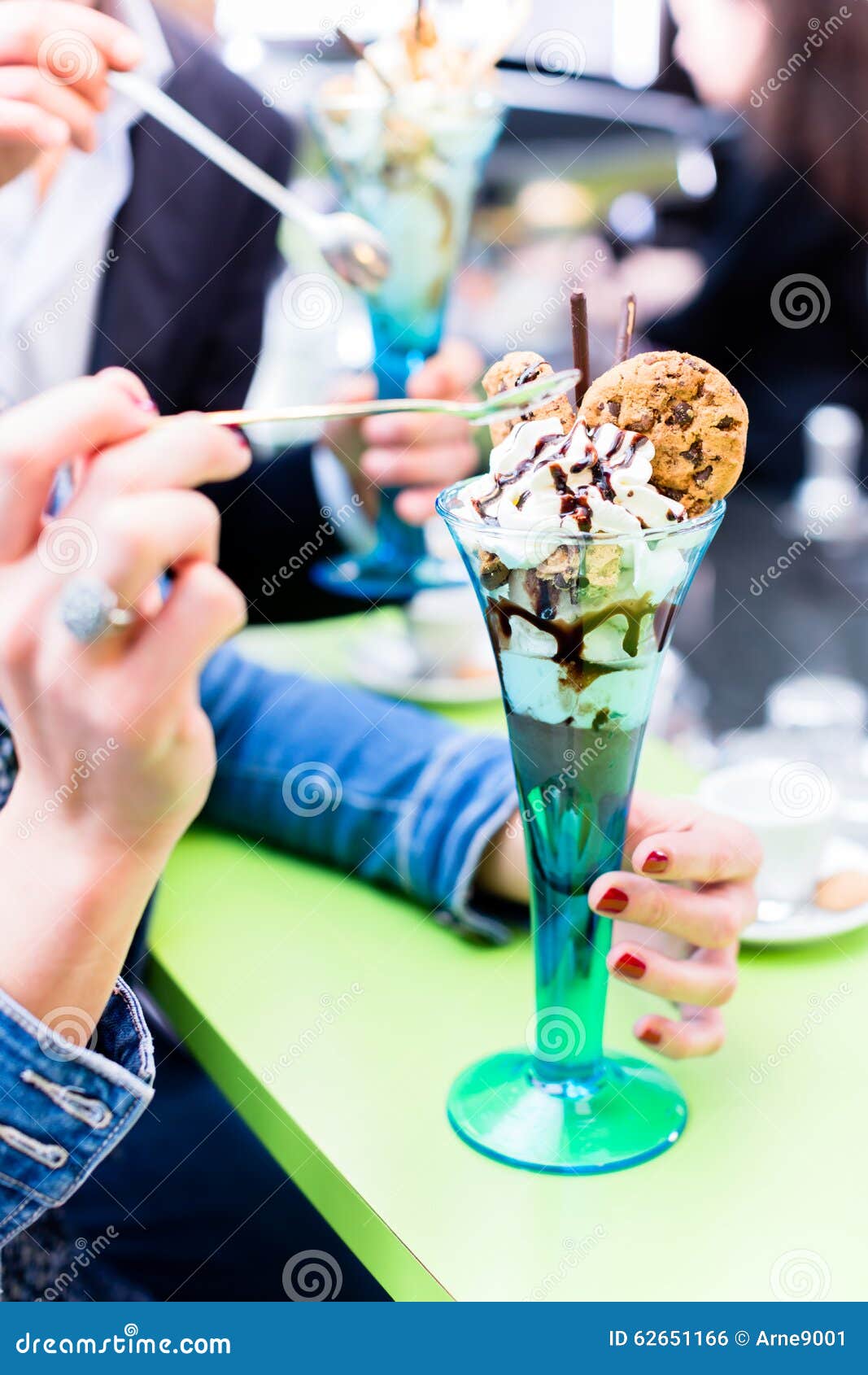 Couple Enjoying an Ice Cream Sundae in Cafe Stock Photo - Image of shop ...