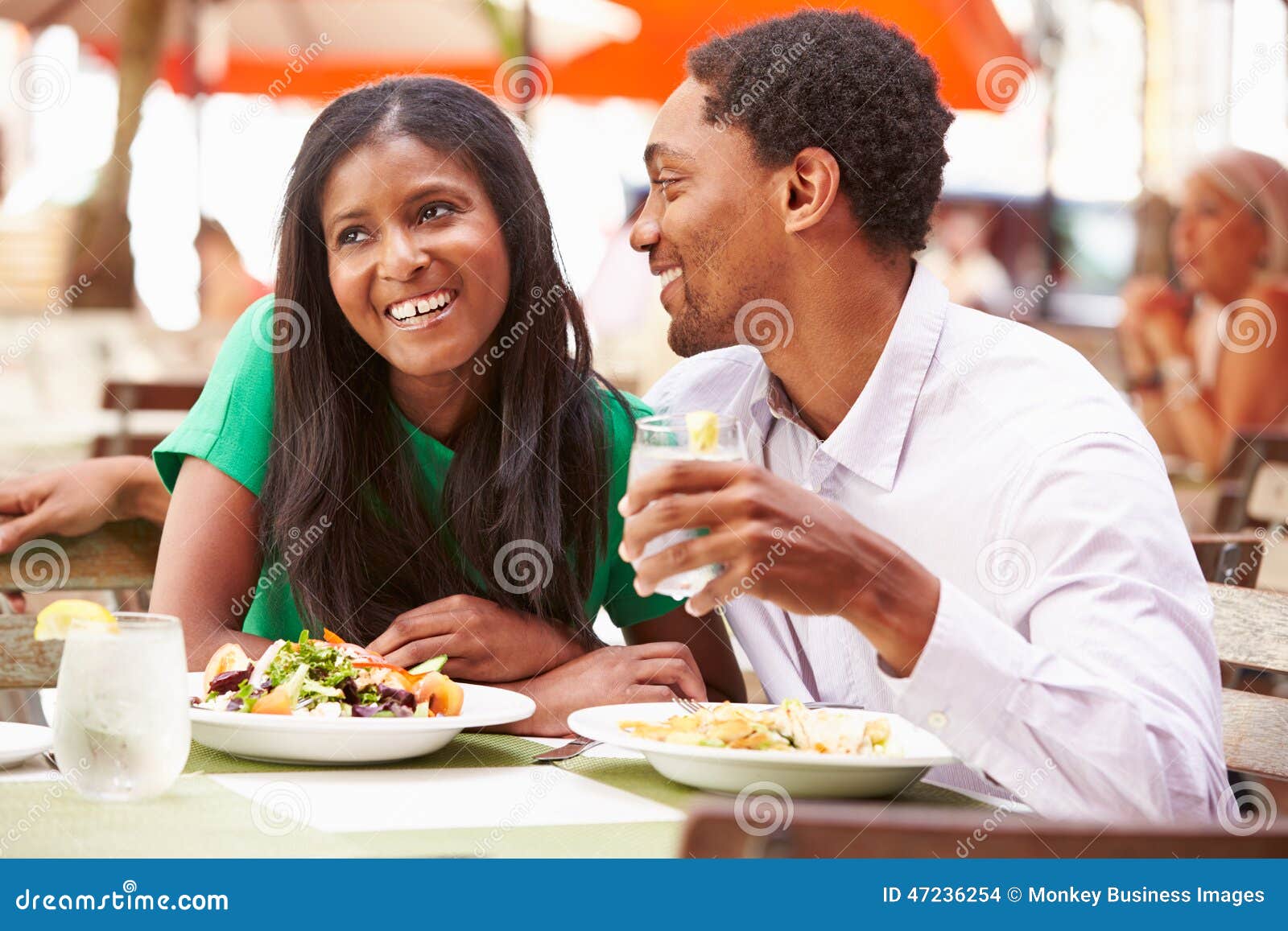 Couple Enjoying Lunch in Outdoor Restaurant Stock Photo - Image of ...